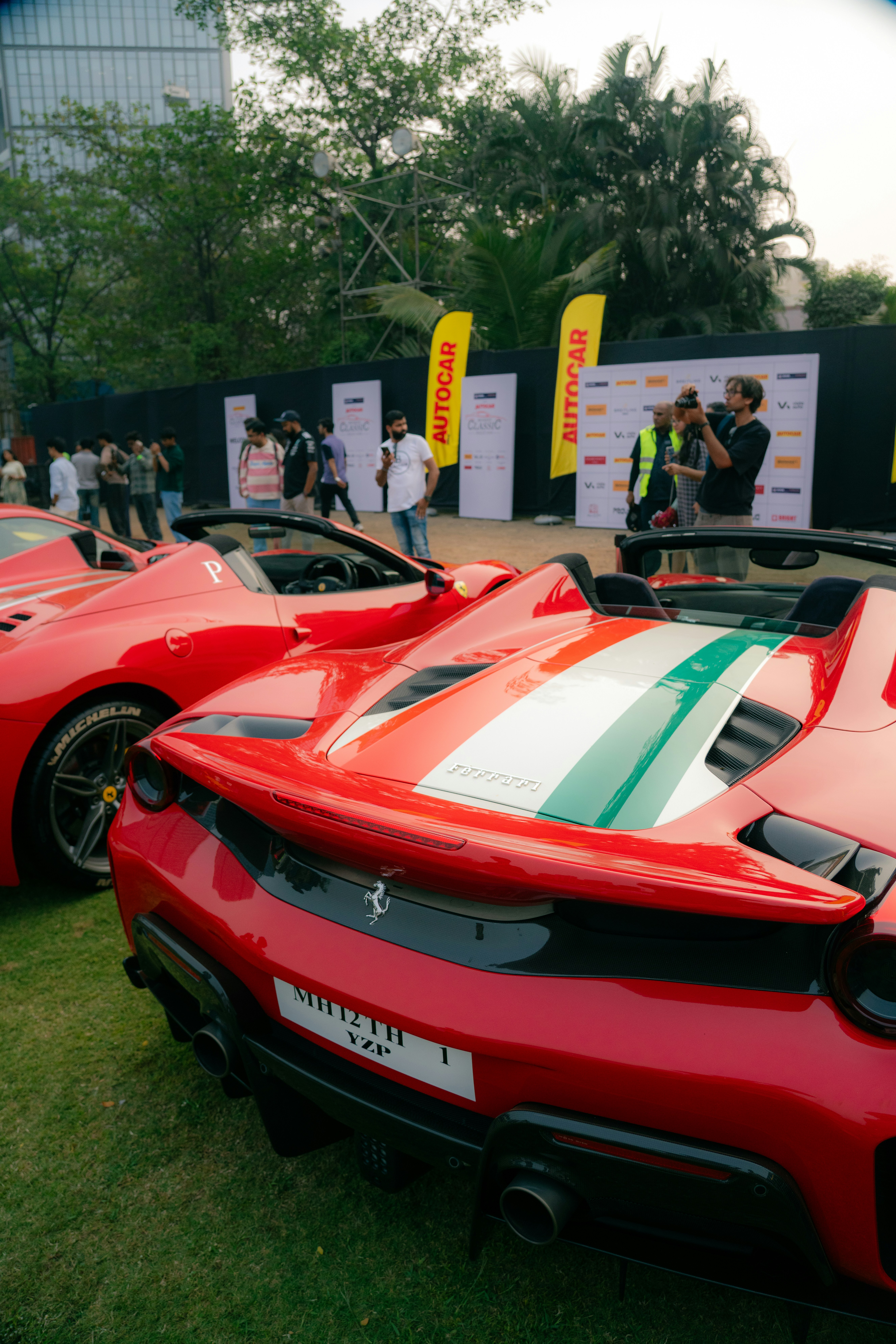 Italian Stallions: Red Ferraris Rally at the Exhibition Grounds