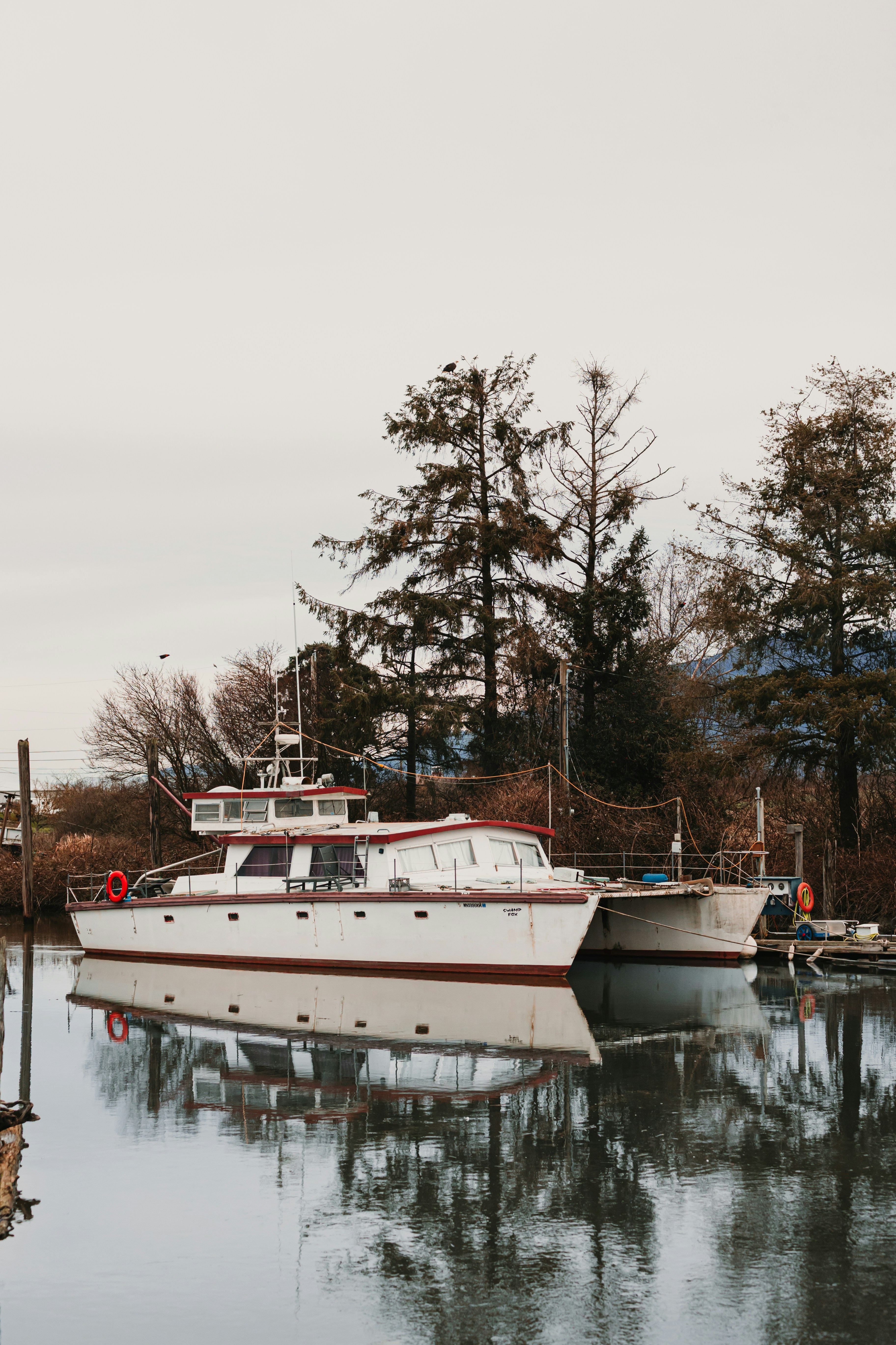 Boat in Calm Harbor: A Quiet Mirror of Dusk