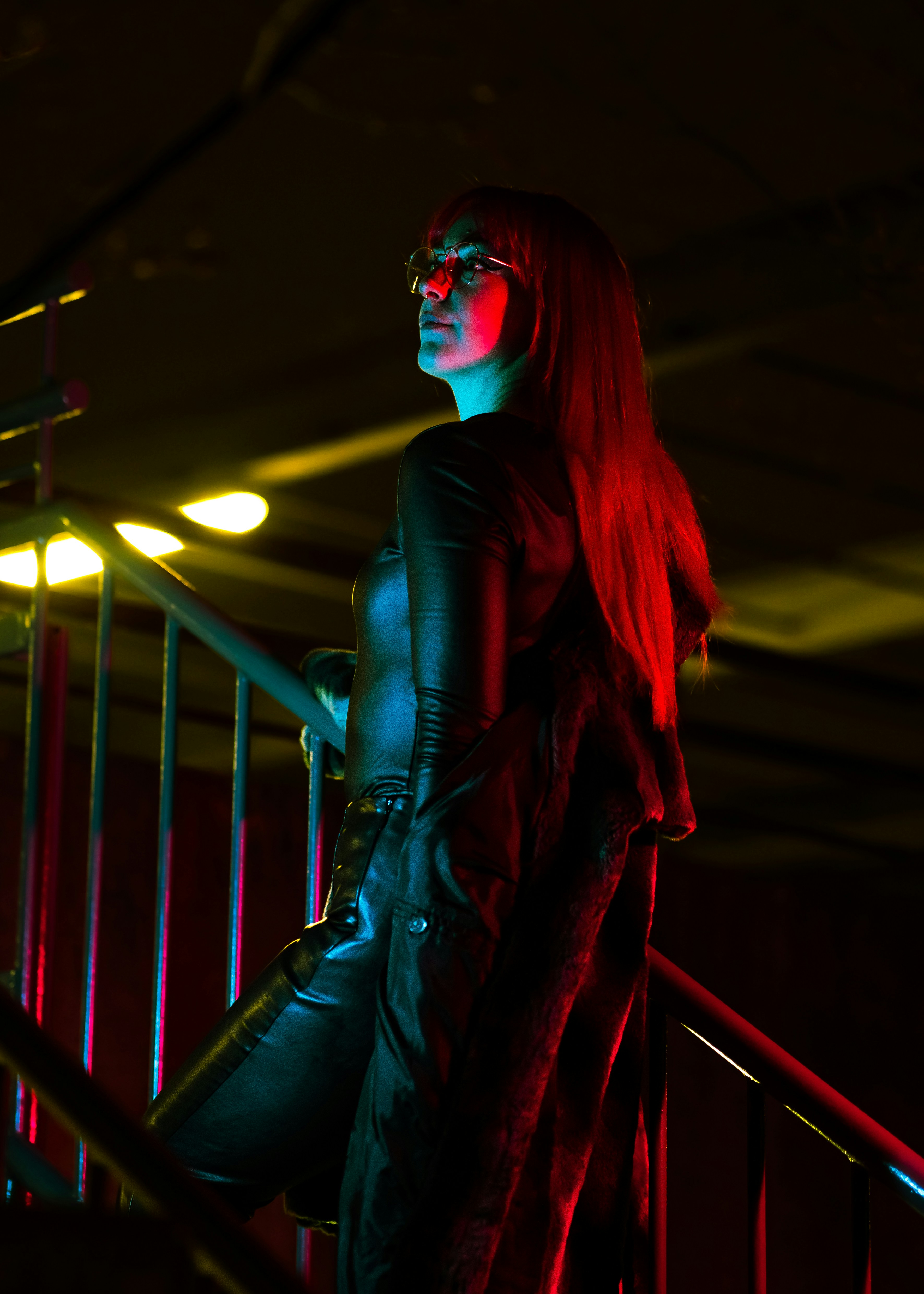 Neon Silhouette: A Night Portrait on the Railing