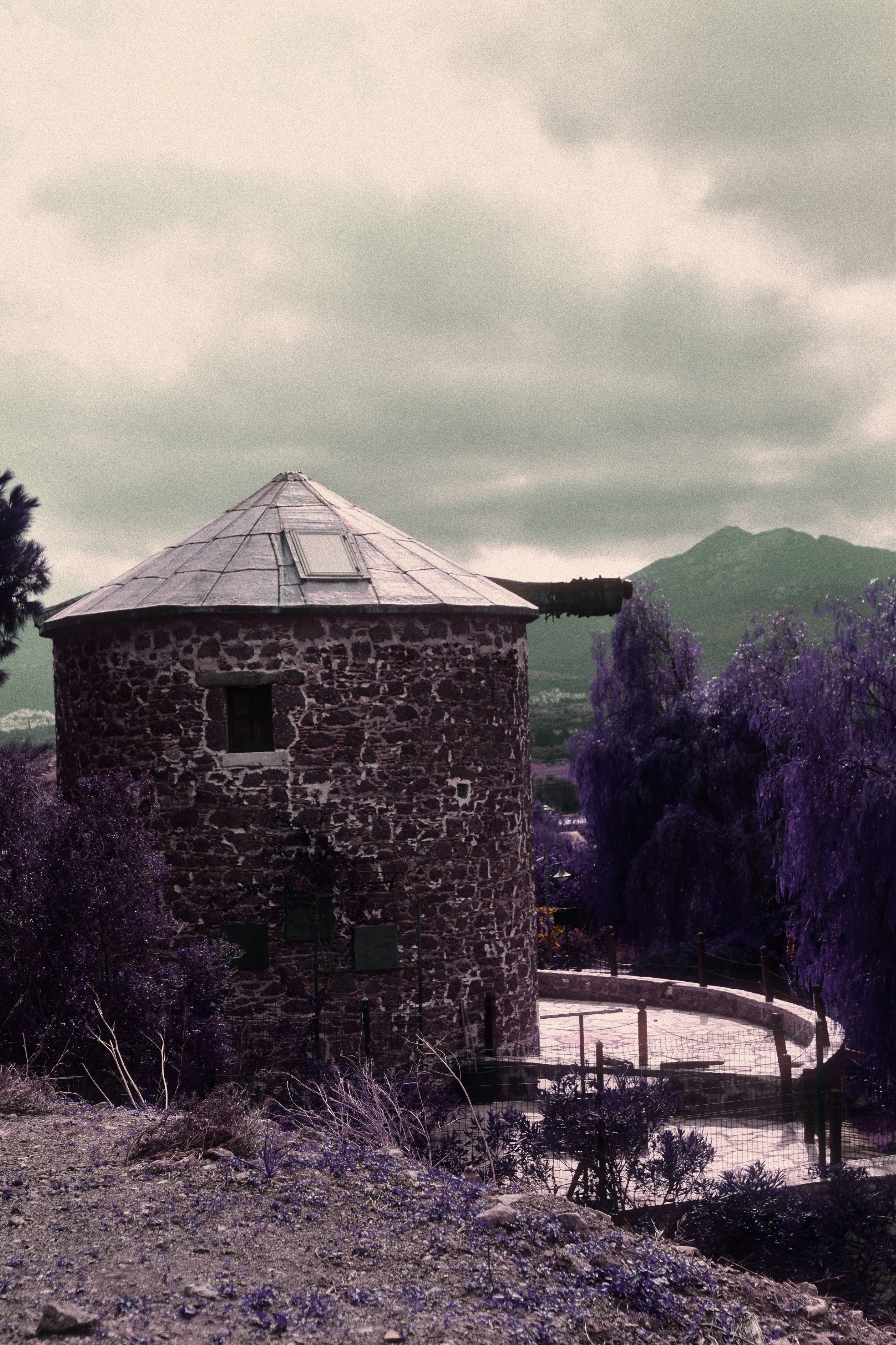 Stone Turret Under Moonlit Purple Trees