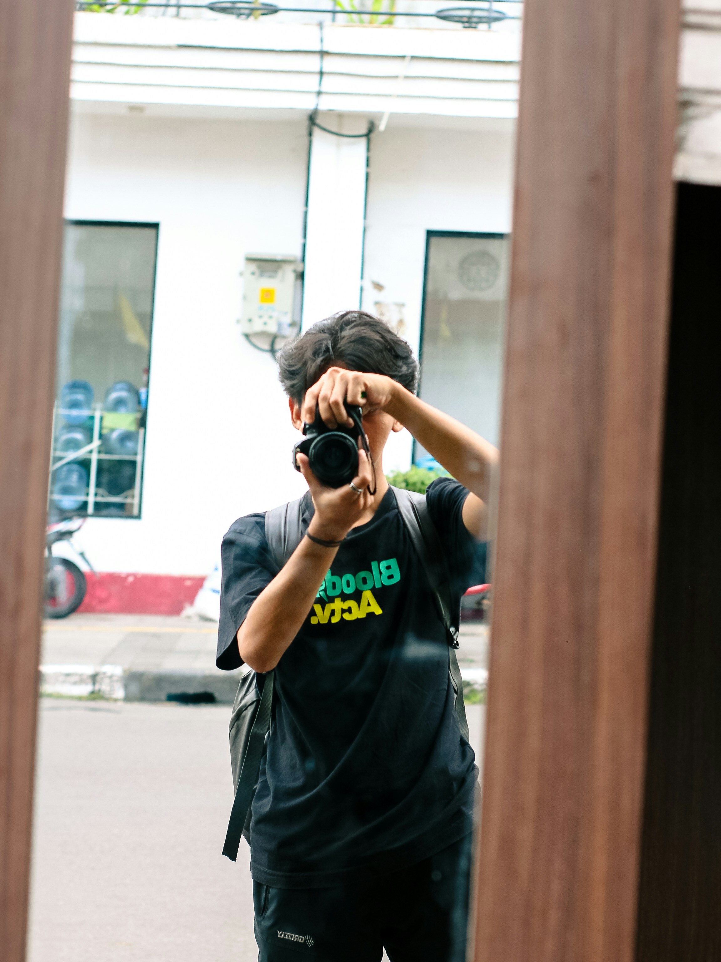 Self-portrait in a doorway: capturing the photographer behind the lens