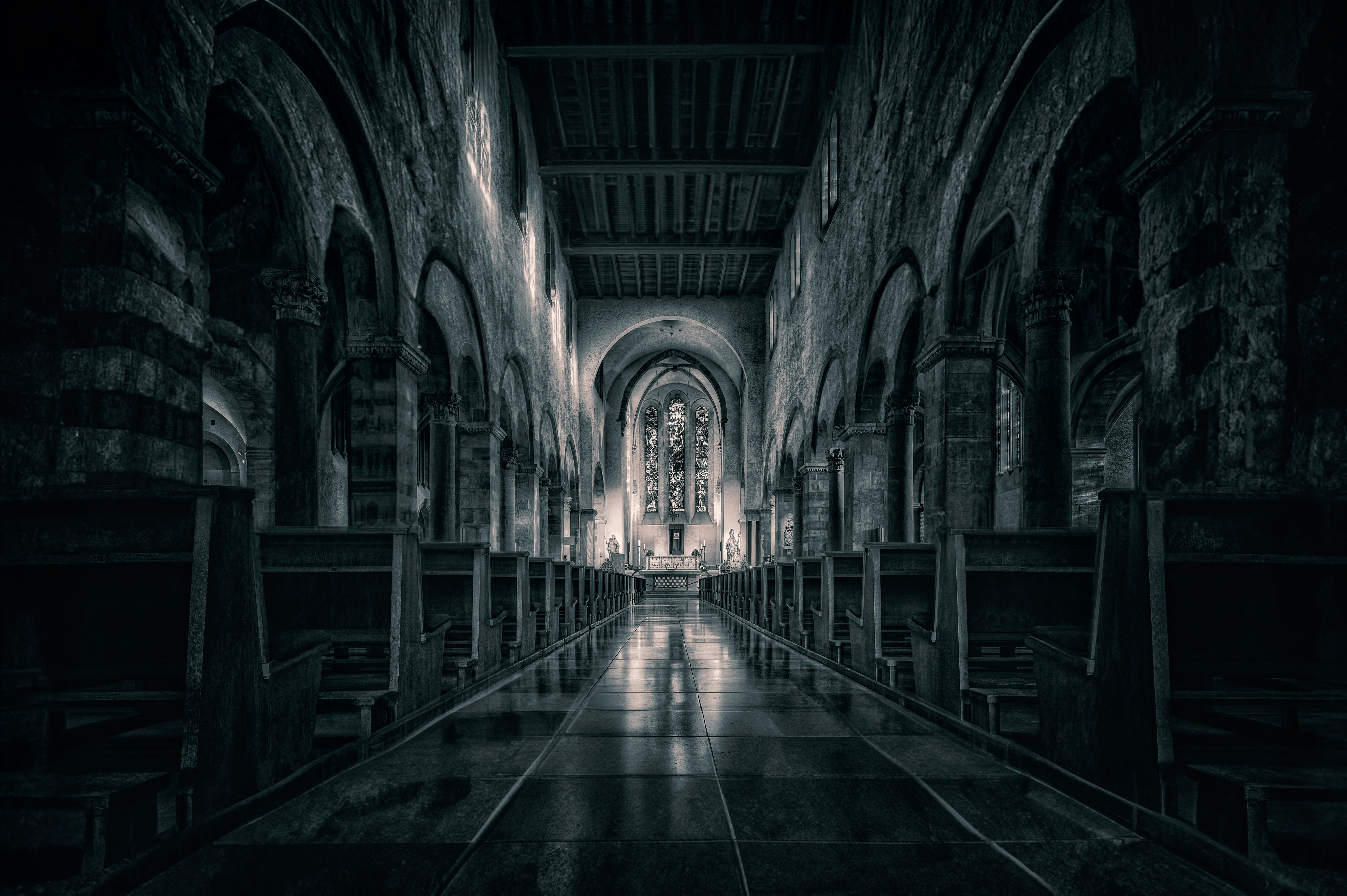 Serene Nave: Quiet Cathedral Corridor Toward a Faint Light