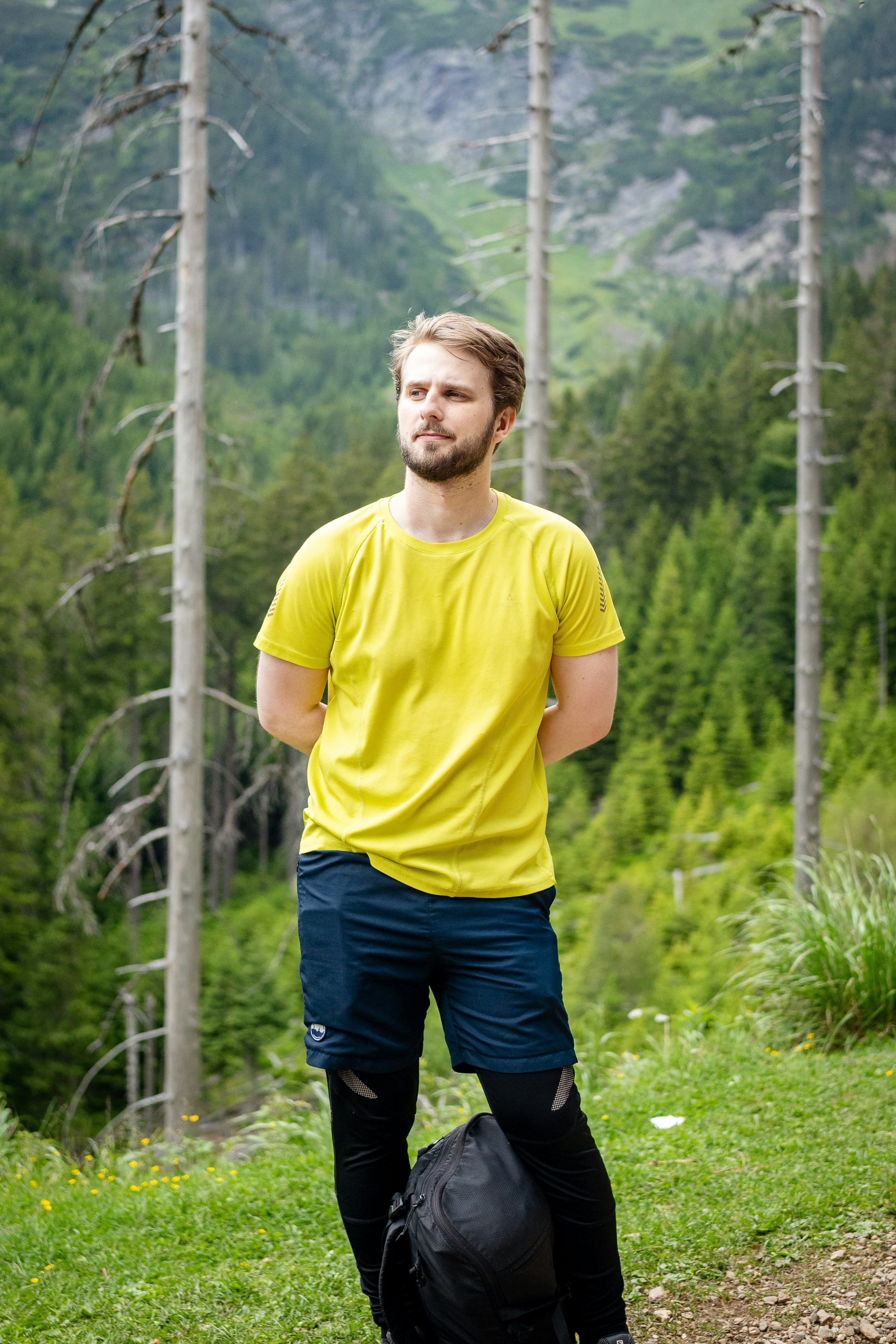 Yellow Shirt, Green Ridge: A Quiet Portrait in the Alpine Meadow