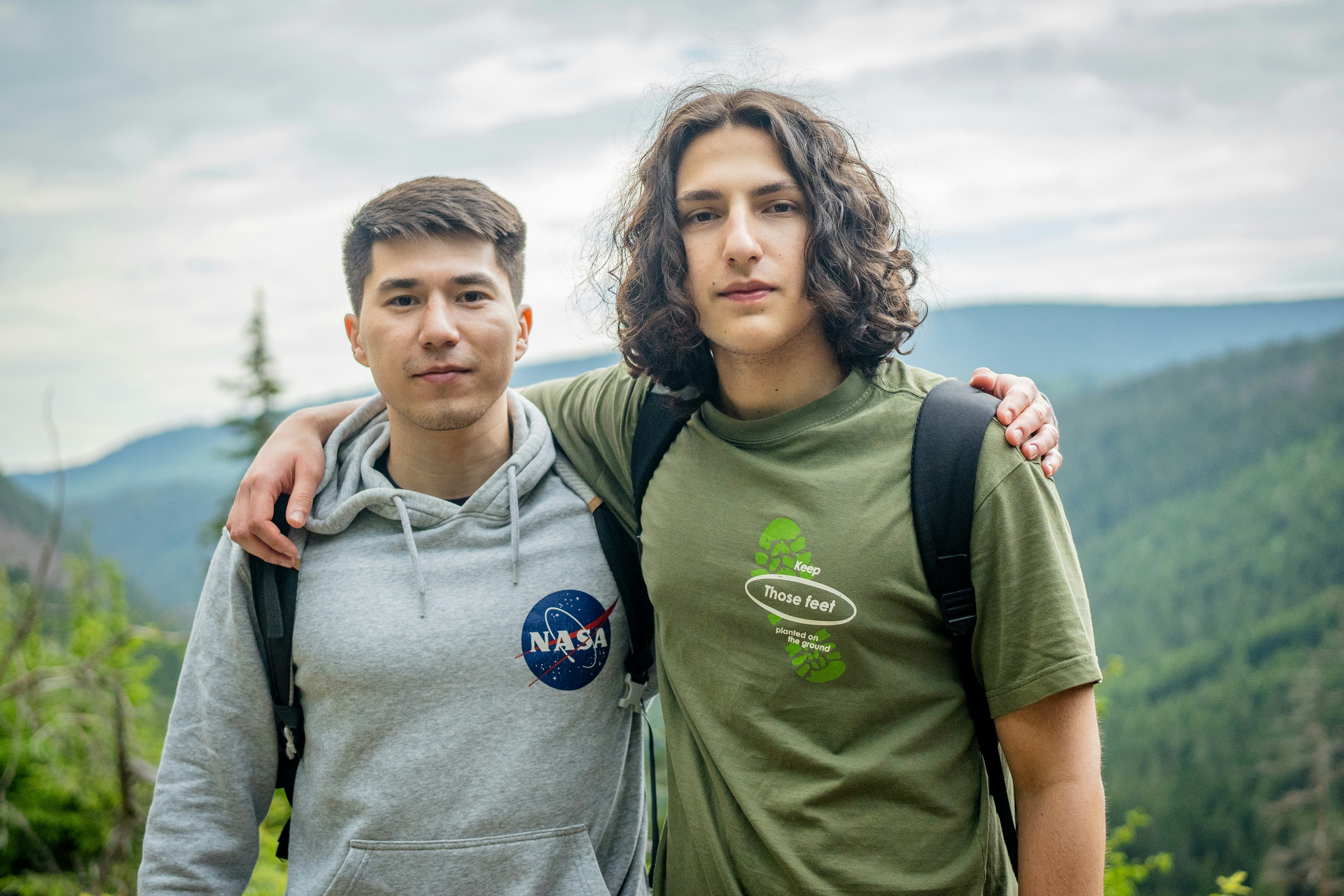 Two young men with backpacks in a forest. photo – Free Forest Image on ...