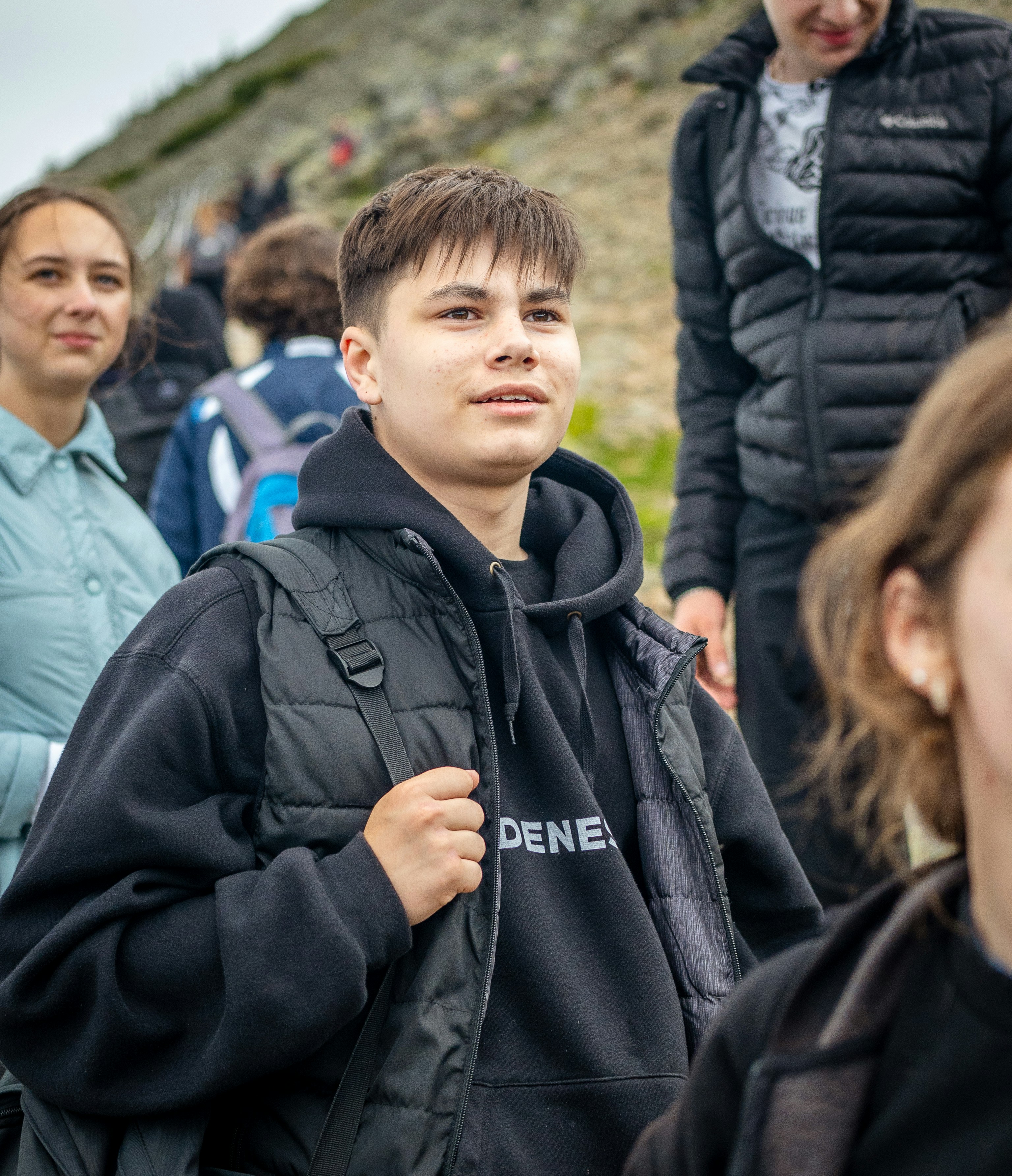 Youthful Leader in a Clustered Hilltop Scene