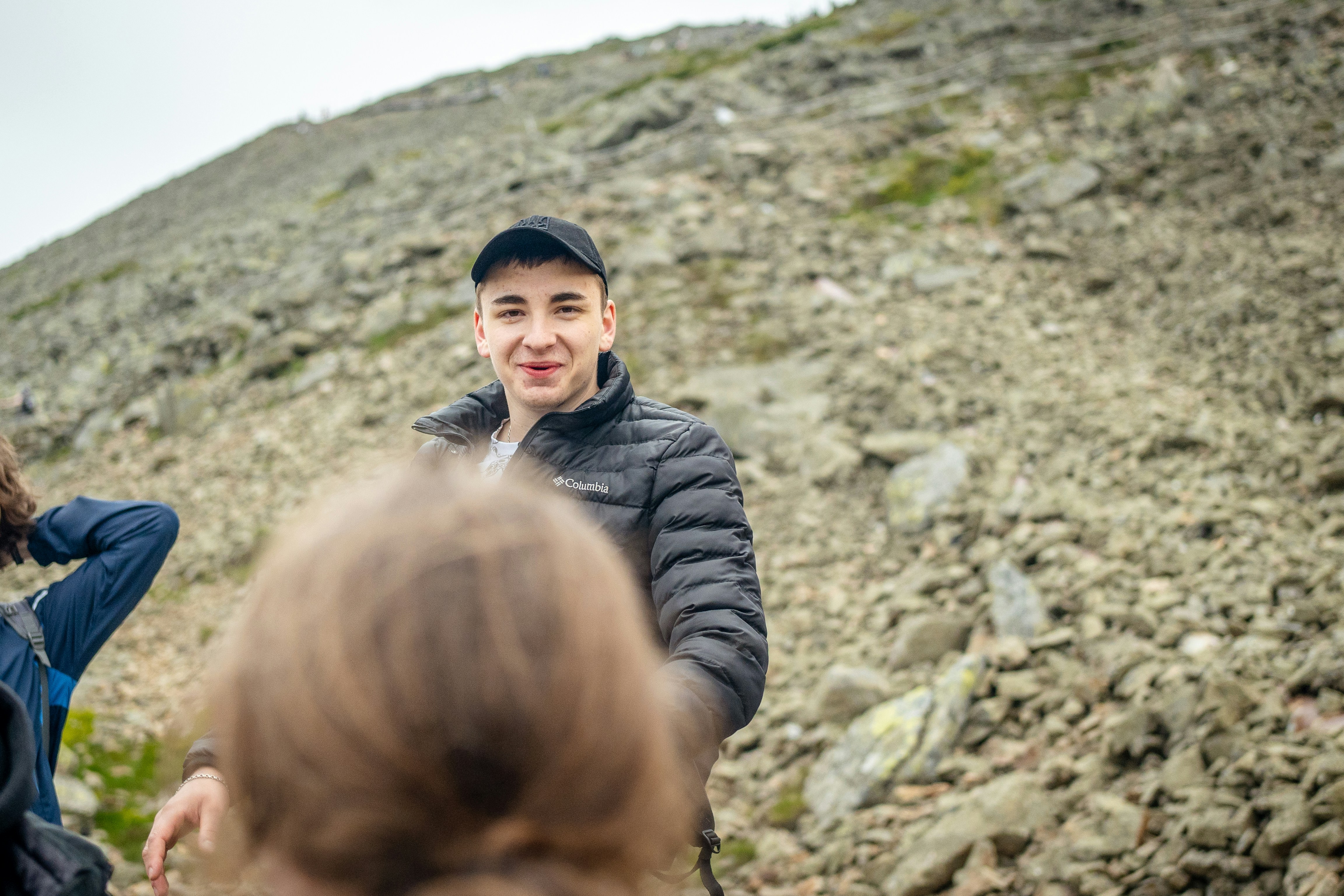 A Quiet Moment on the Slope: Friendliest Gaze in a Rugged Landscape