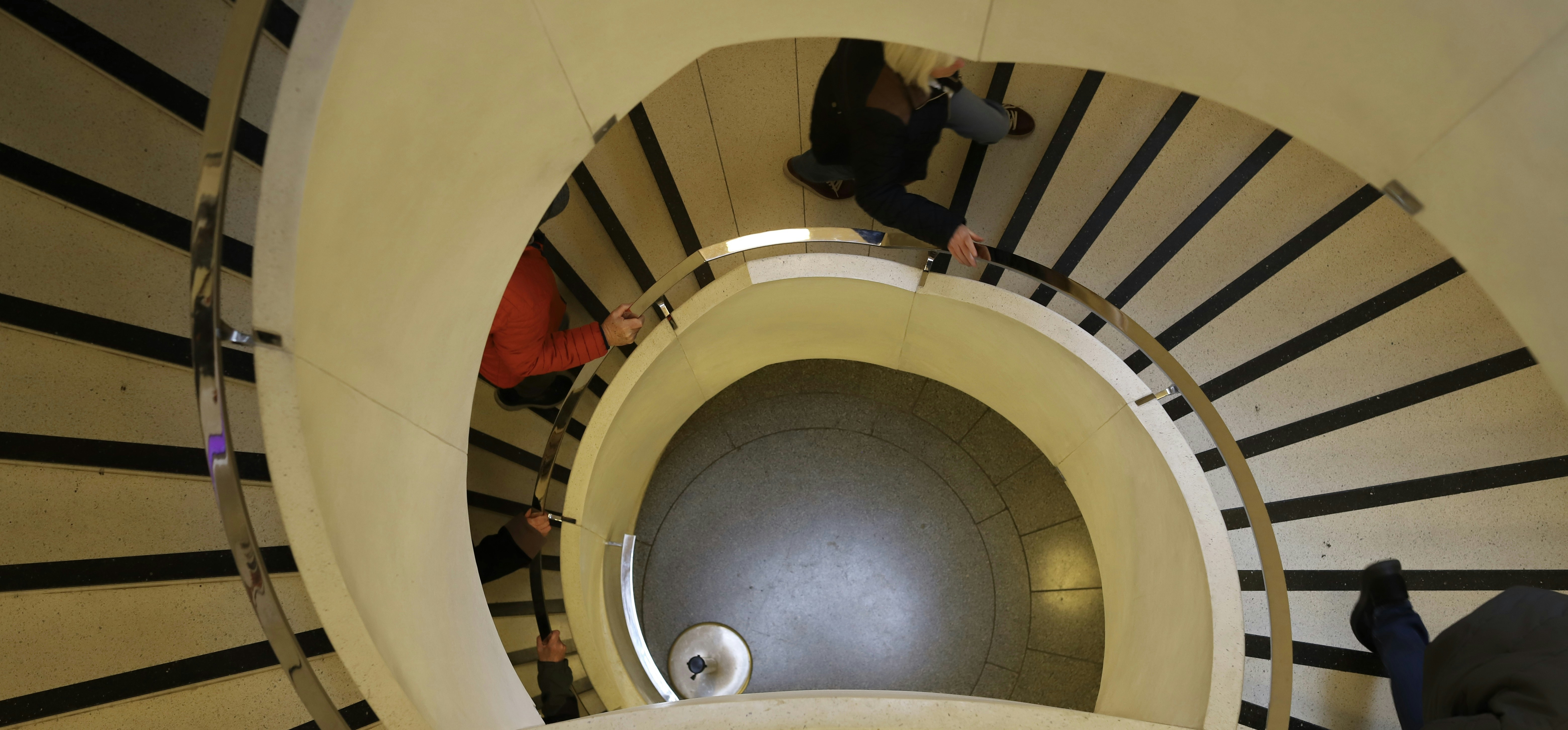 Spiral Descent: A Bird’s-Eye Tour of an Atrium Staircase