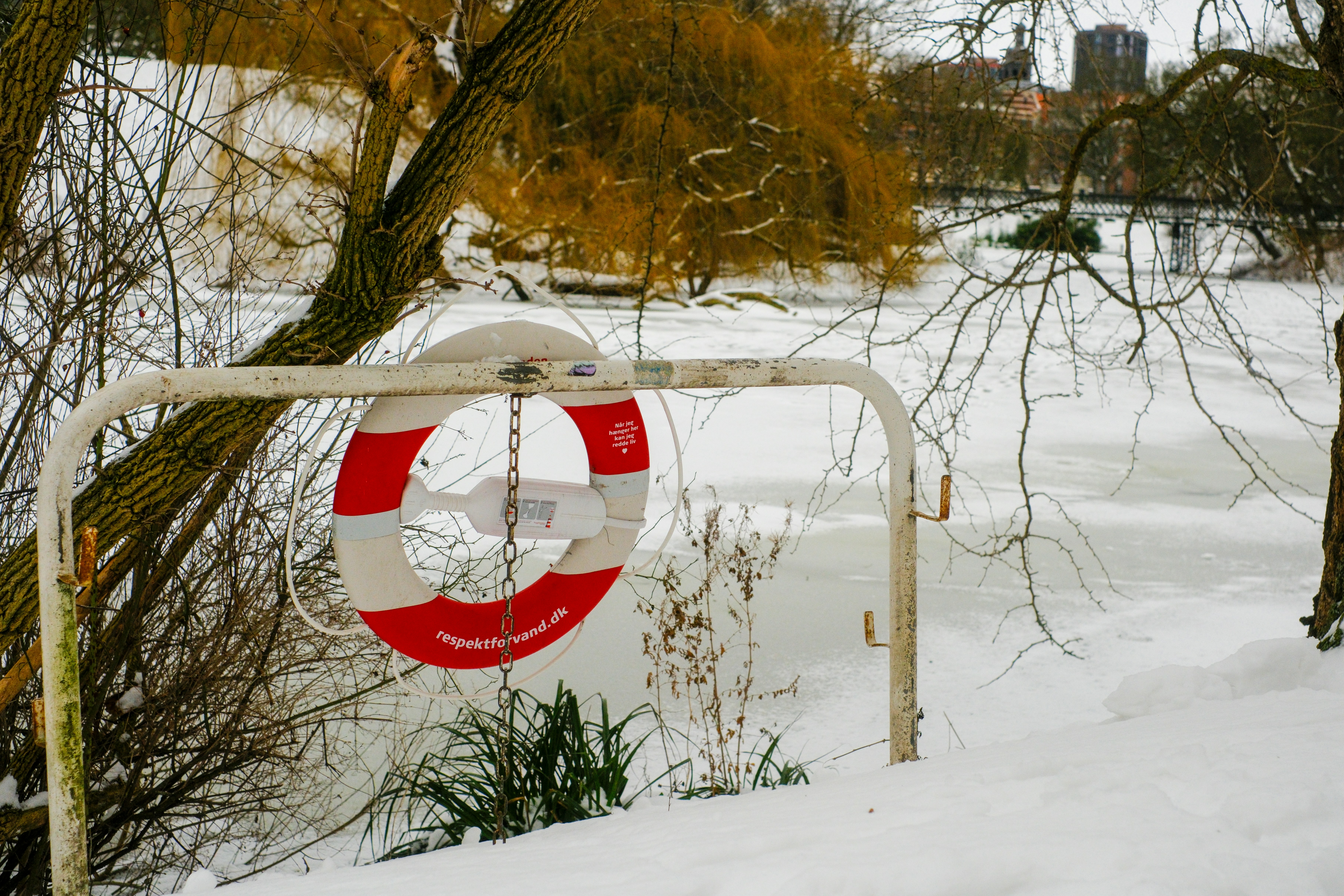 Lifebuoy Gatekeeper Over Snowbound Canal