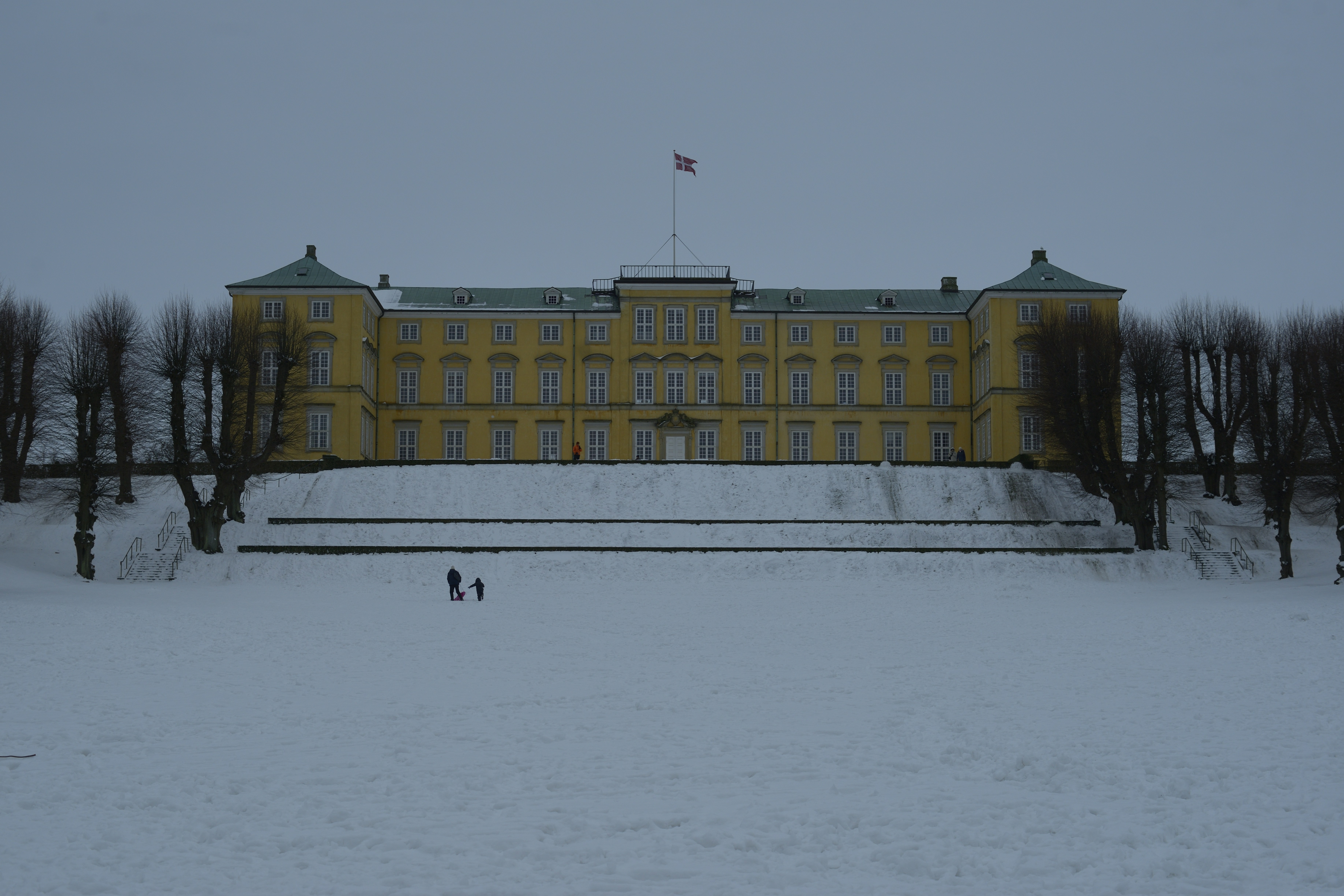 Winter's Anchor: The Yellow Estate Against the Snow