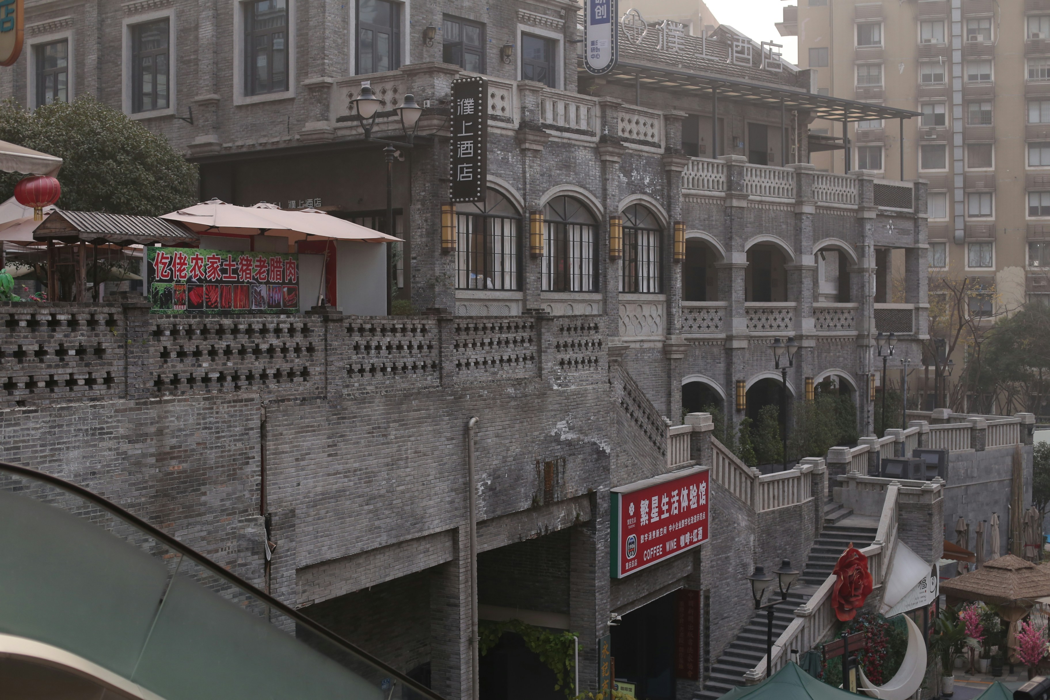 Stone Terrace Overlook: A Historic Streetway Framed by Arched Facades