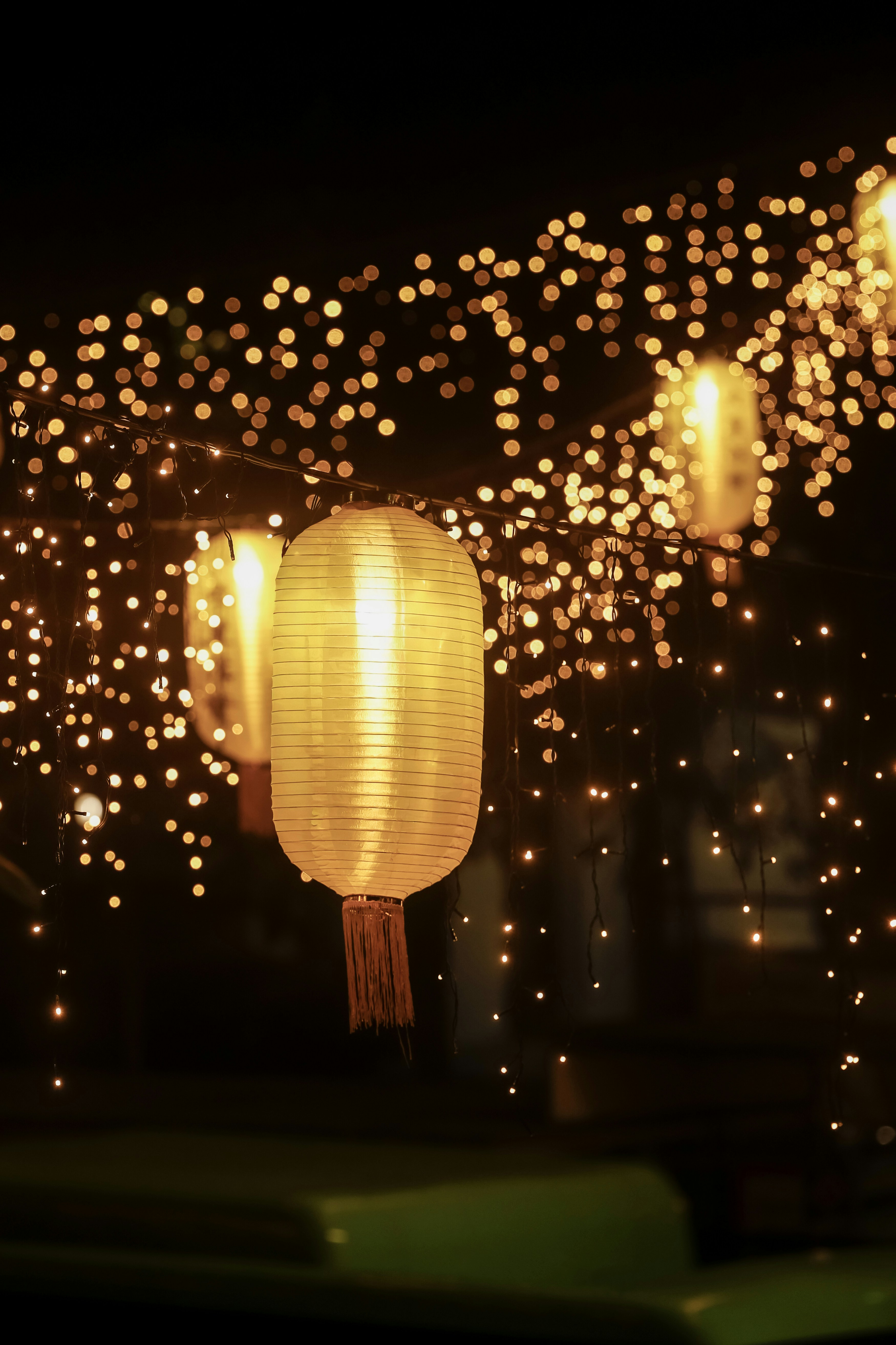 Warm Lanternscape: A Field of Golden Orbs at Night