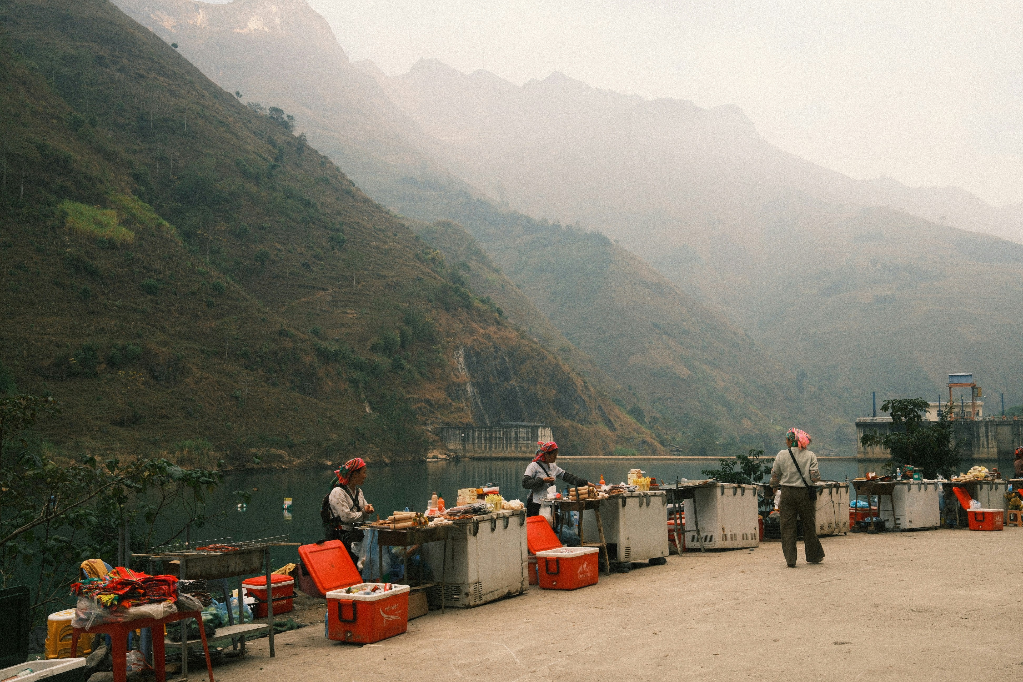 Harbor of Fish Vendors by the Mountain Fjord