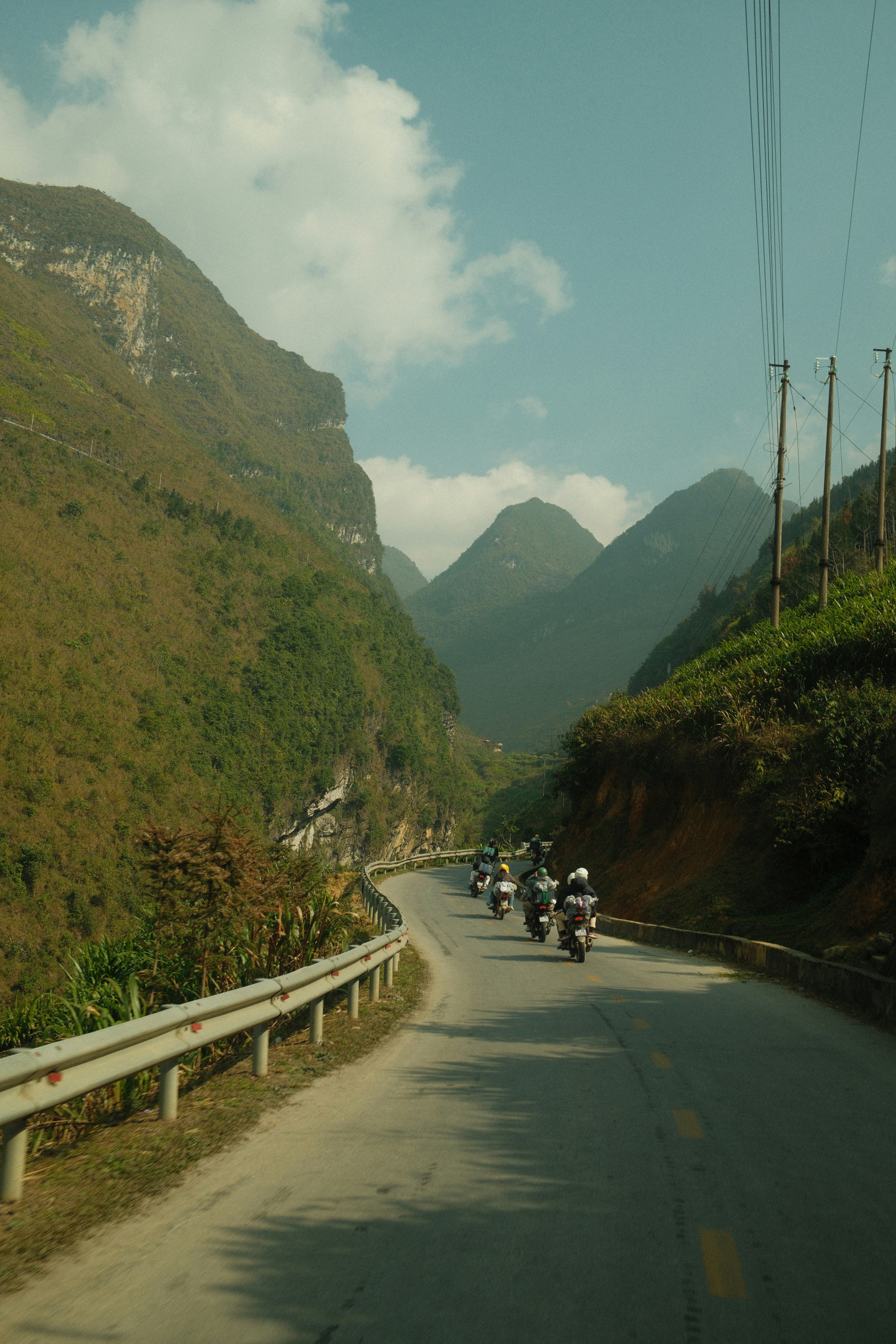 Motorcycle Caravan Wens the Valley: A Winding Mountain Pass