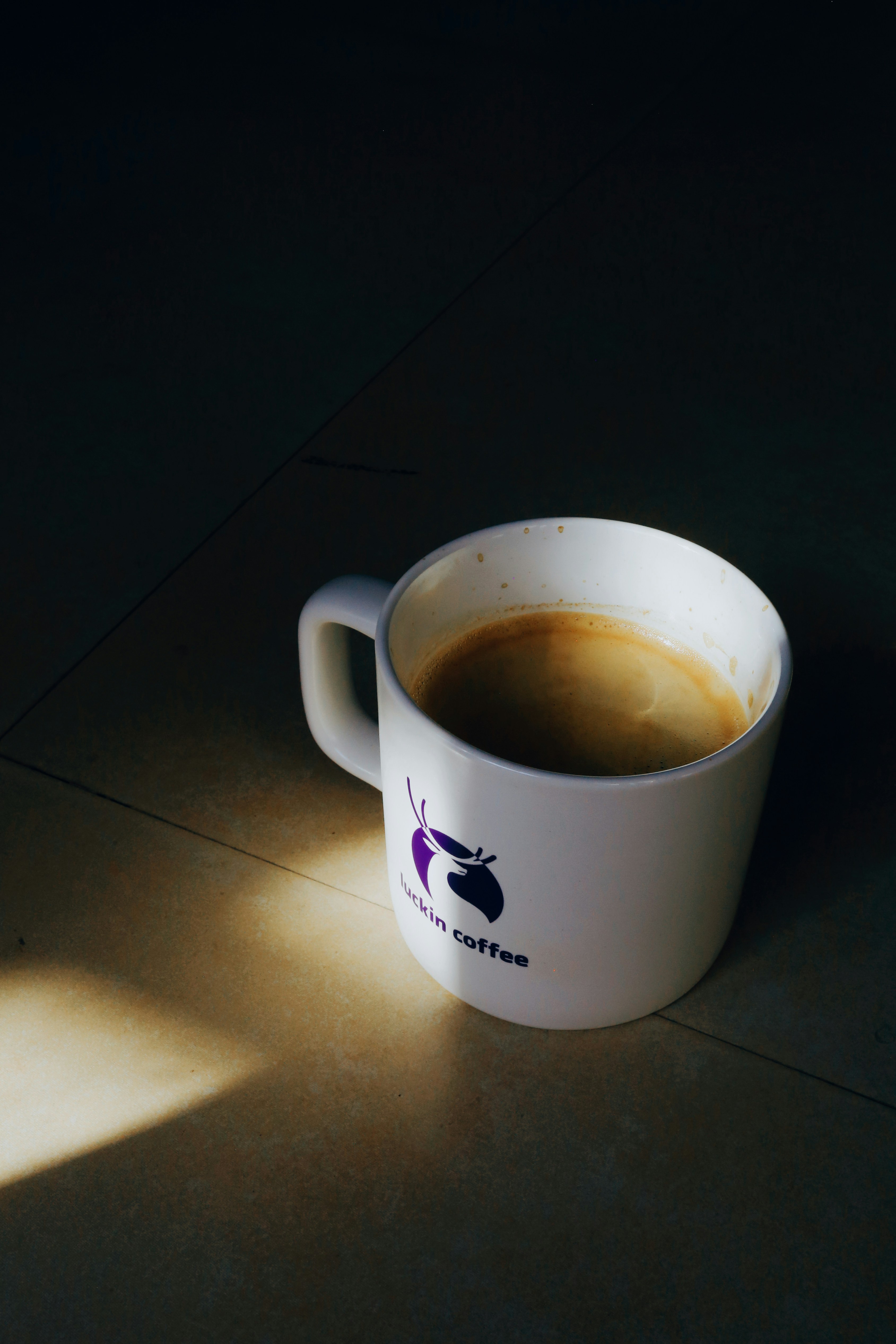 Sunlit Steam: A Coffee Mug at the Corner Table