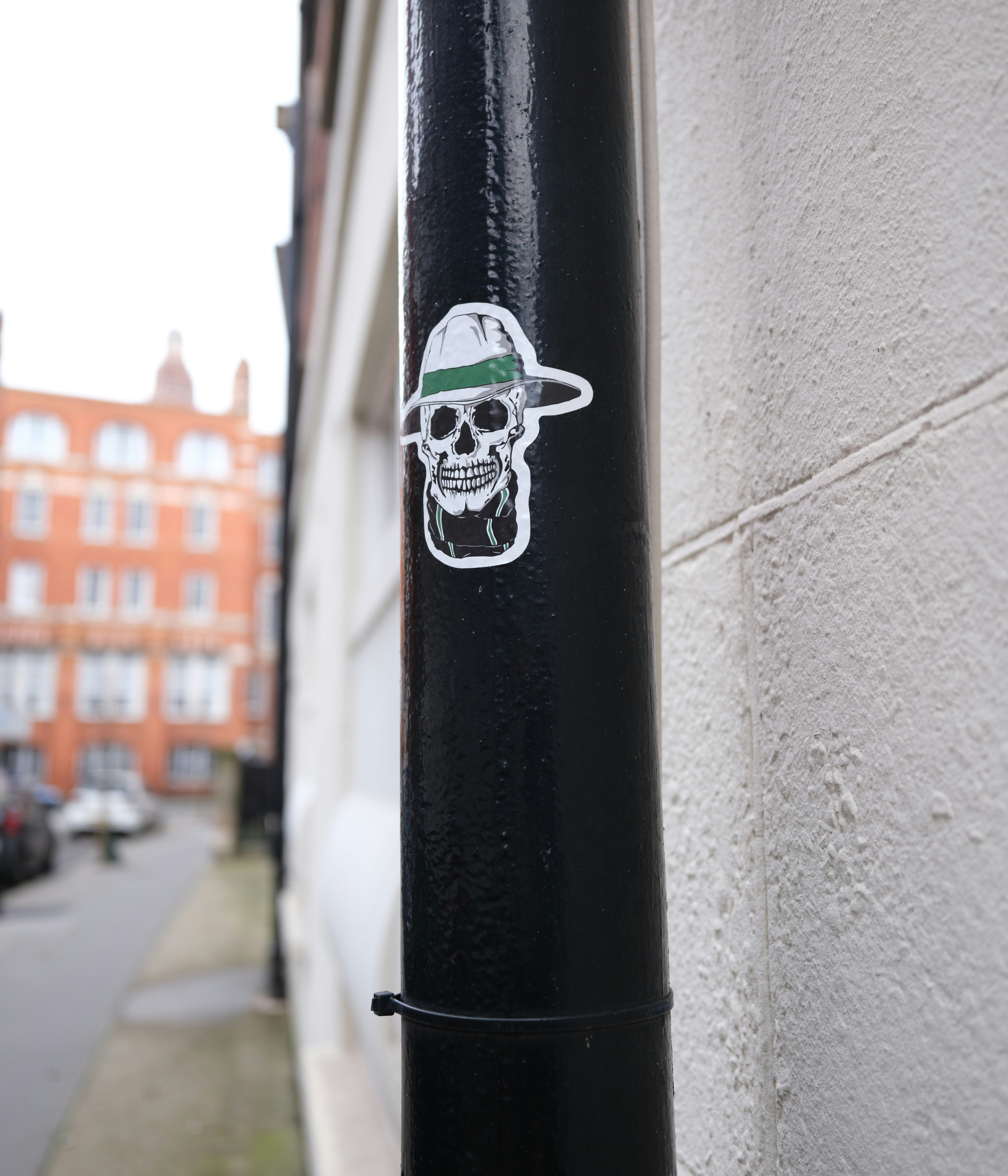 Stickered Post, City Street, and Textured Pipe