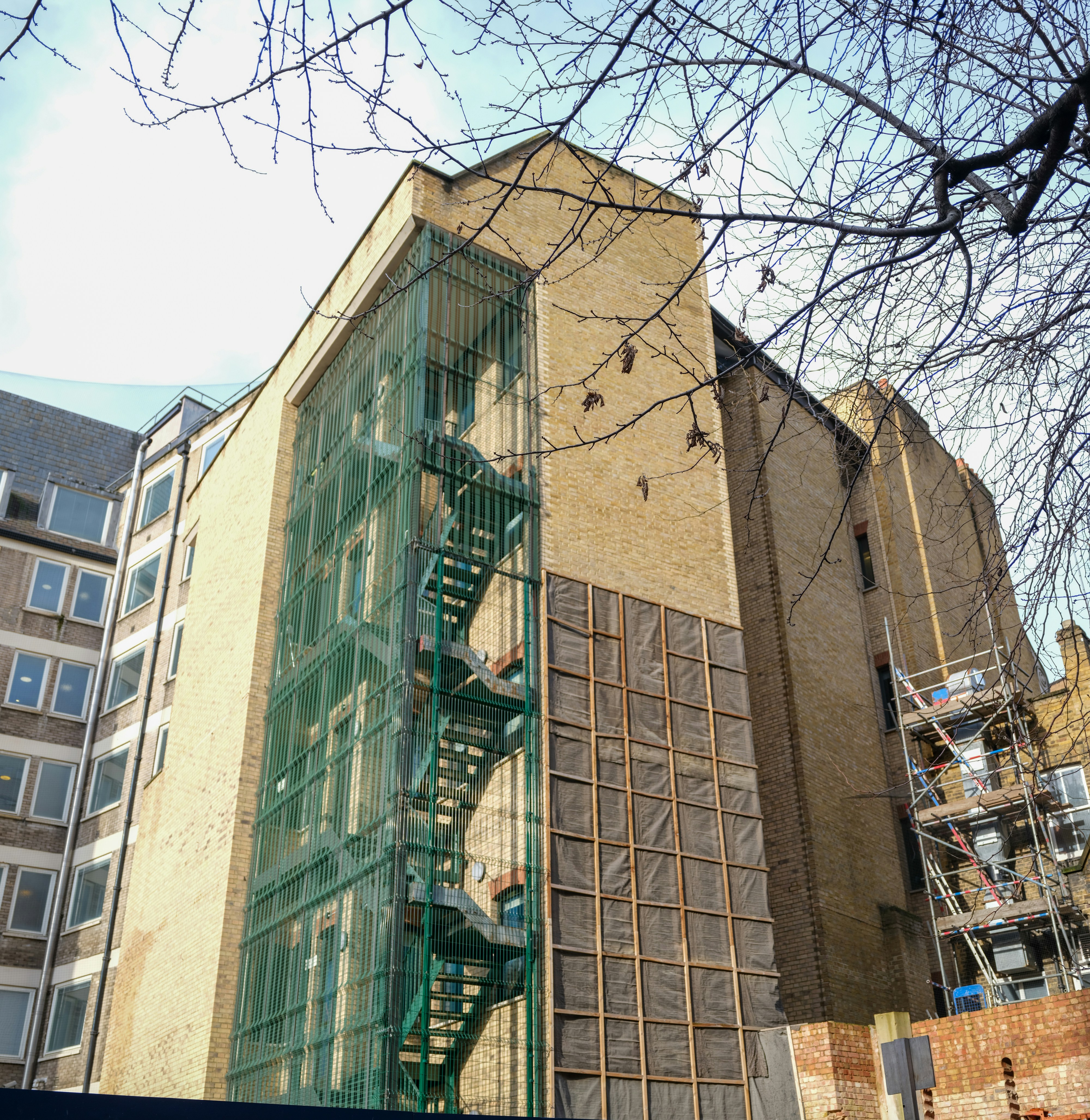 Glass-and-brick Facade: A Building’s Vertical Maze