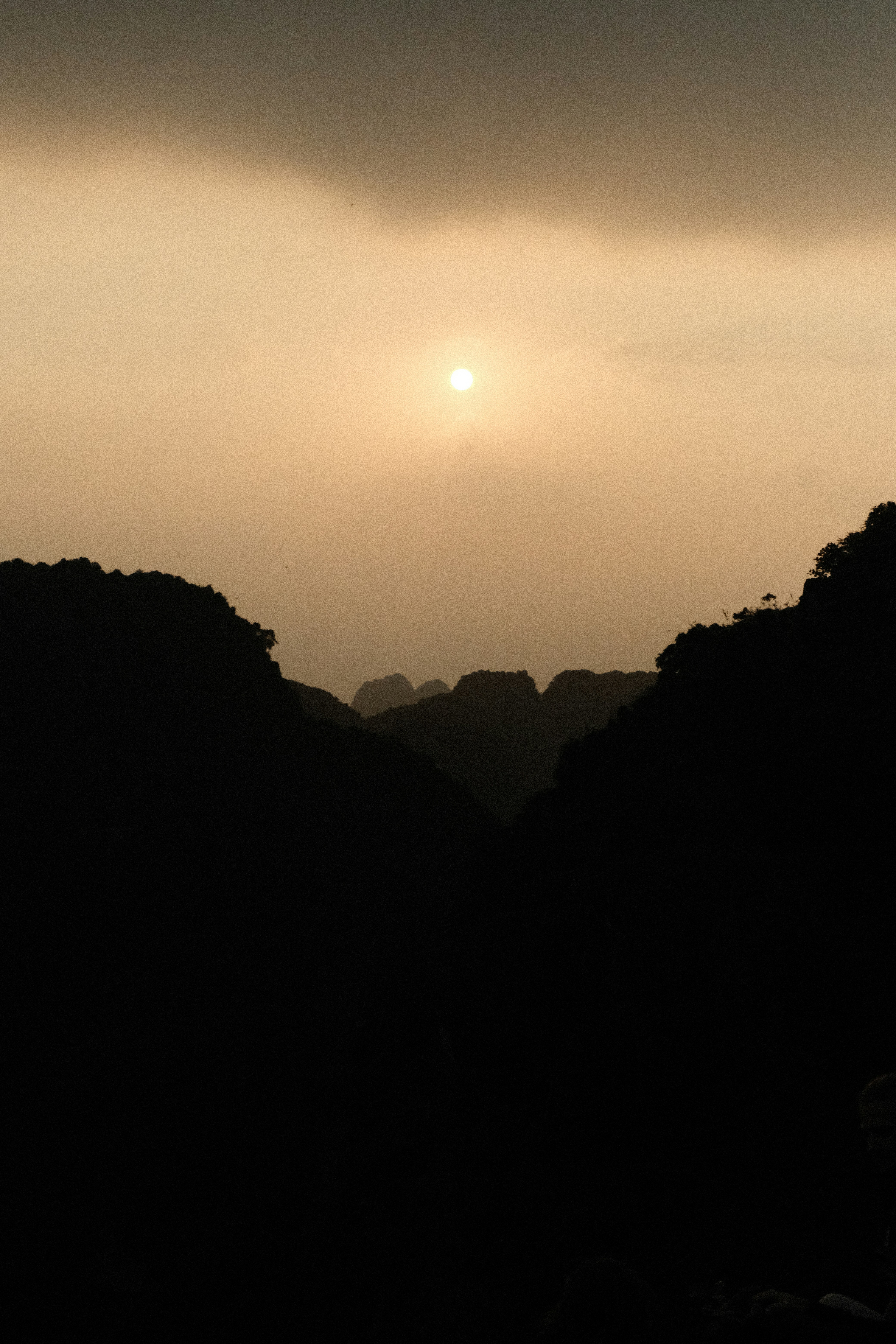 Sunlit Pass Between Silent Peaks at Dusk