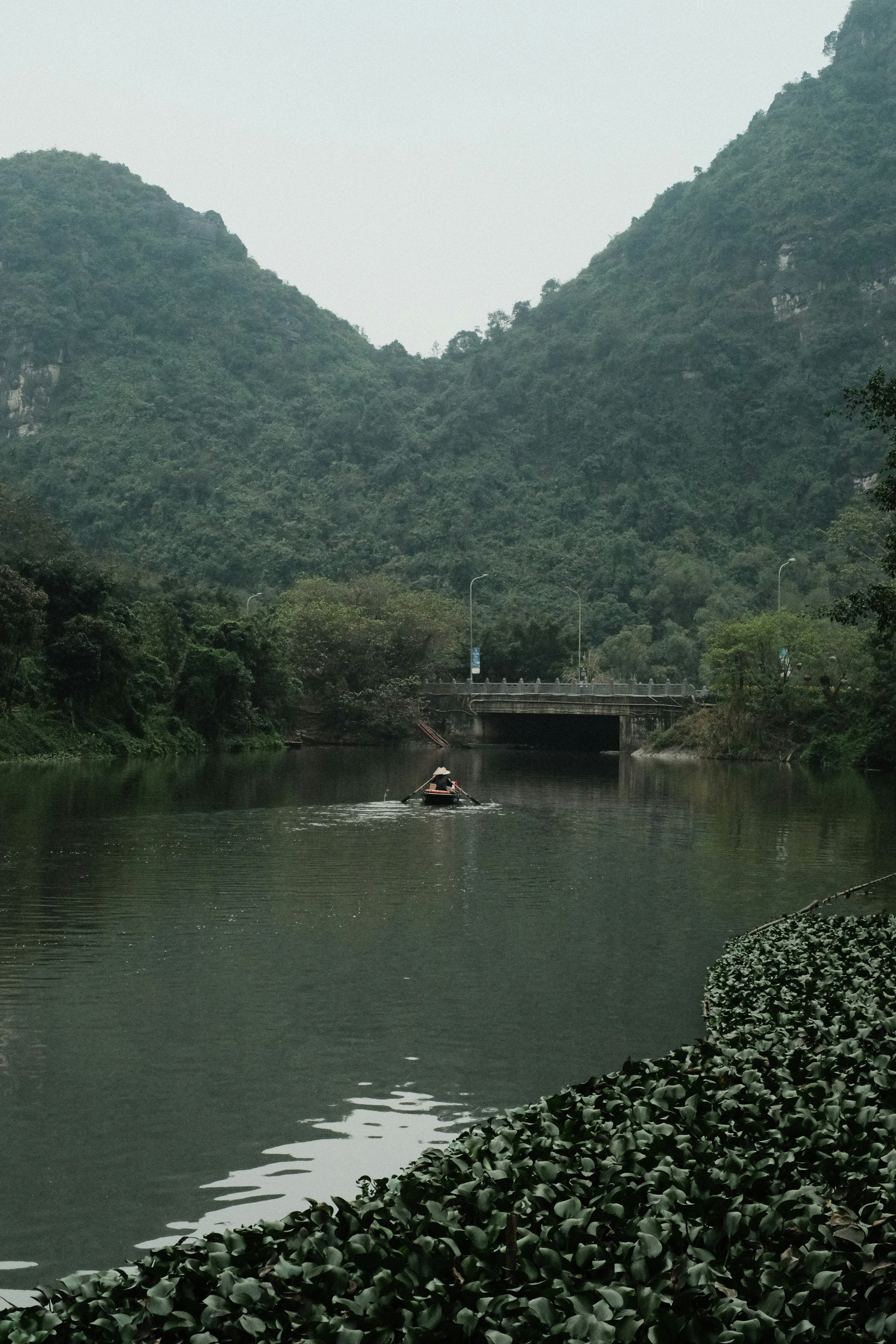 Quiet River Crossing Beneath Green Mountain Highway