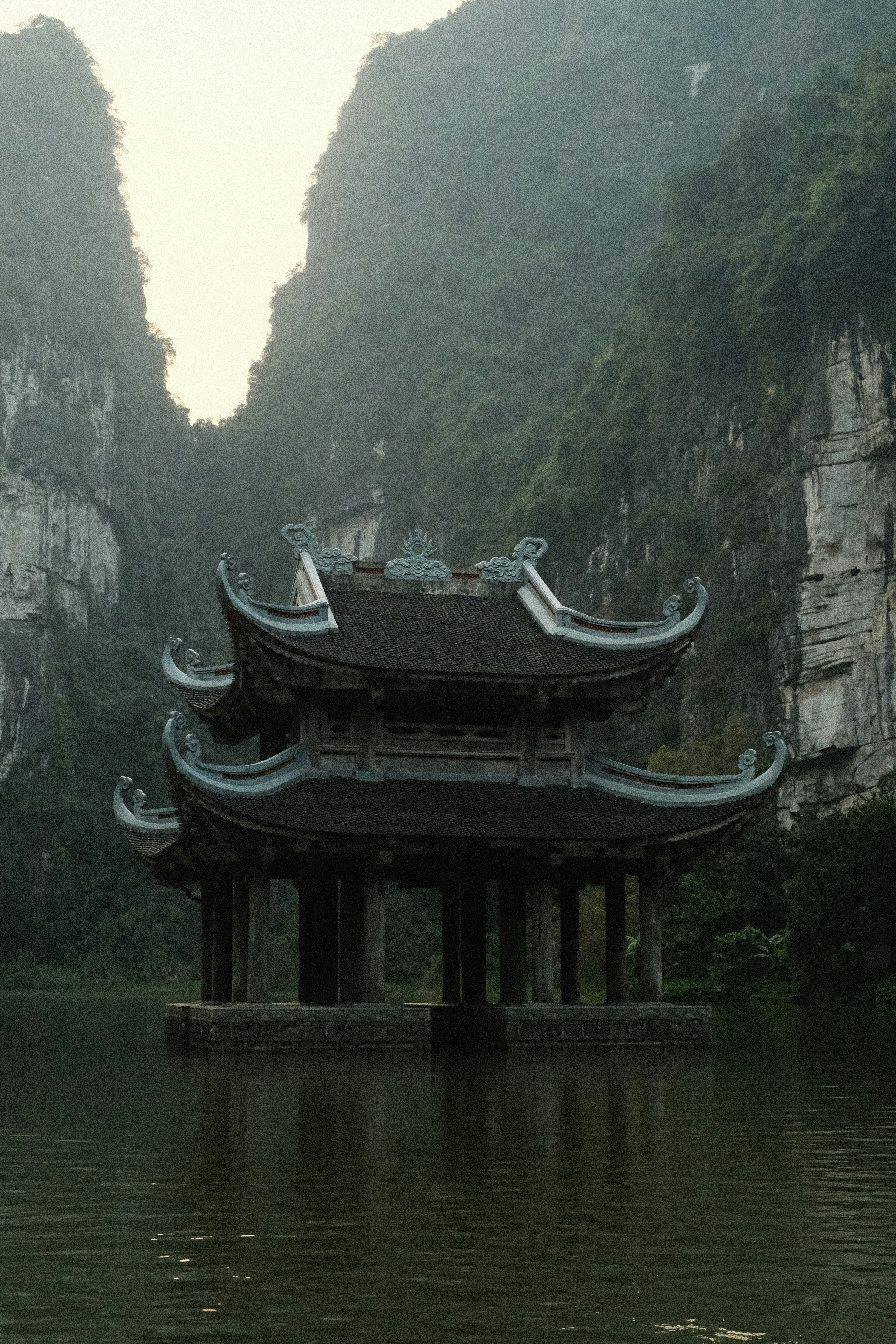 Pagoda on Still Waters: A Lone Pavilion Amid Karst Cloisters