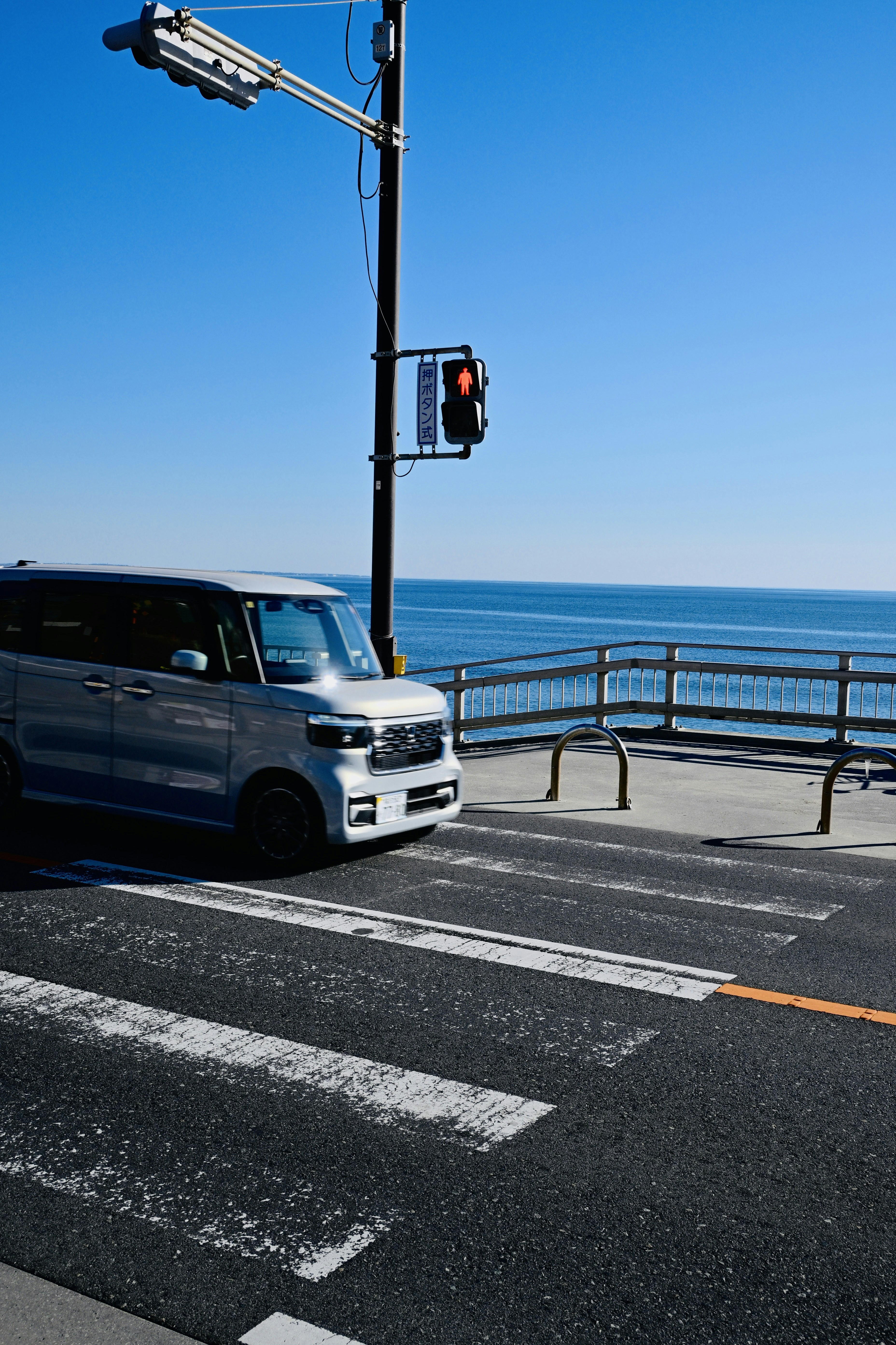 Coastal Crossing: A Quiet Drive by the Sea