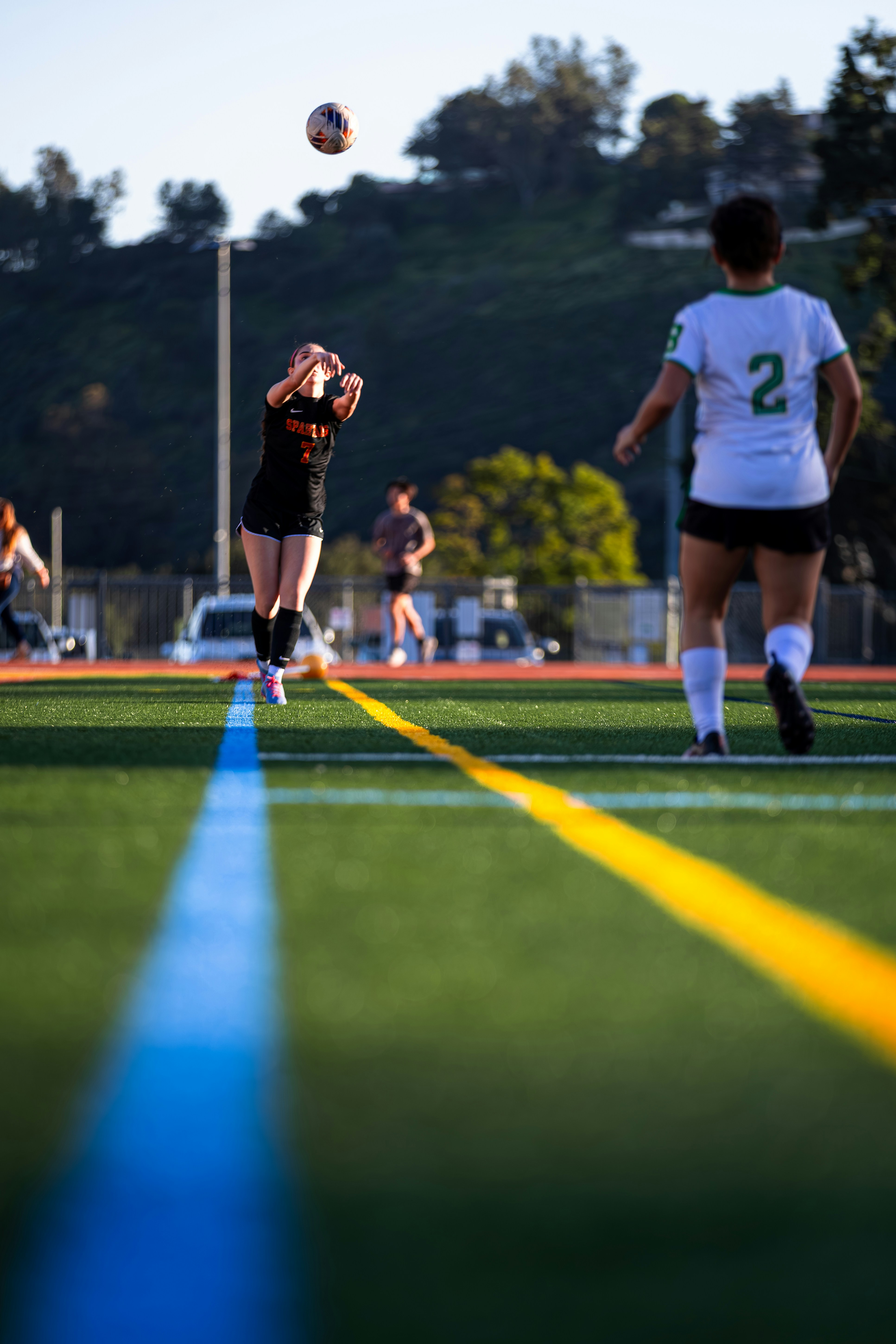 Volley in Focus: A Moment of Impact on the Field