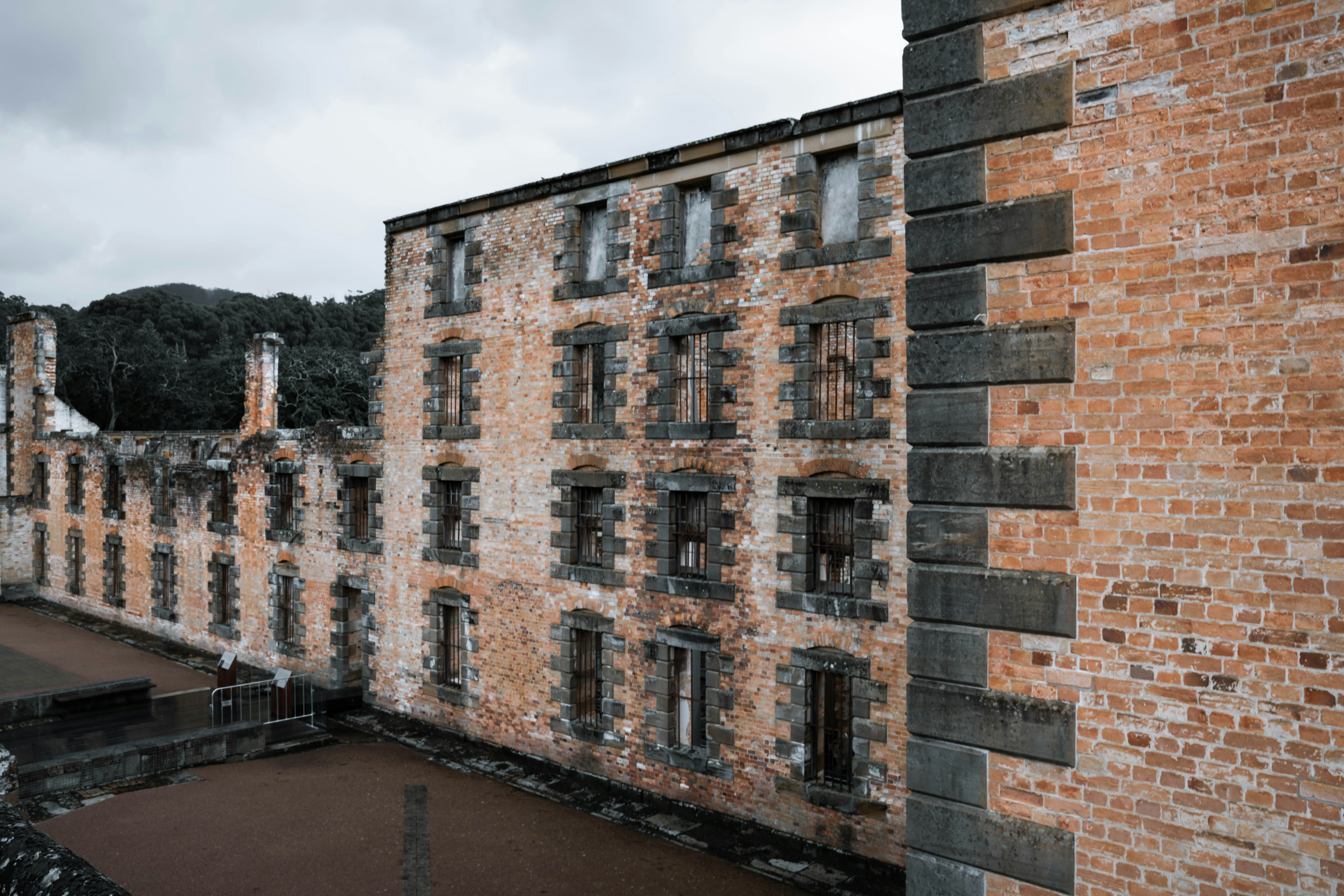 Old brick prison ruins with broken windows photo – Free Prison Image on ...