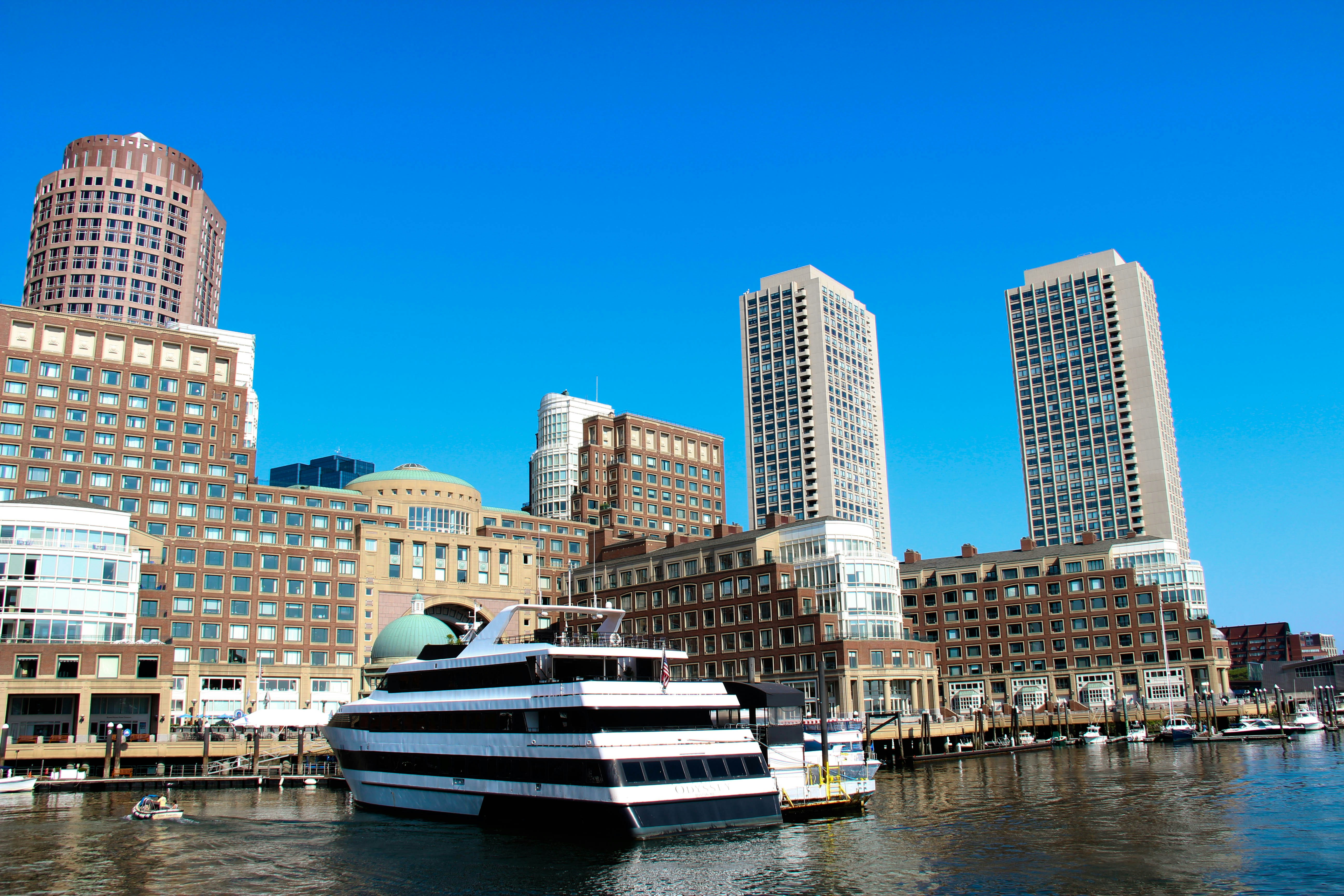 Harbor in the City: A Docked Vessel and Waterfront Towers