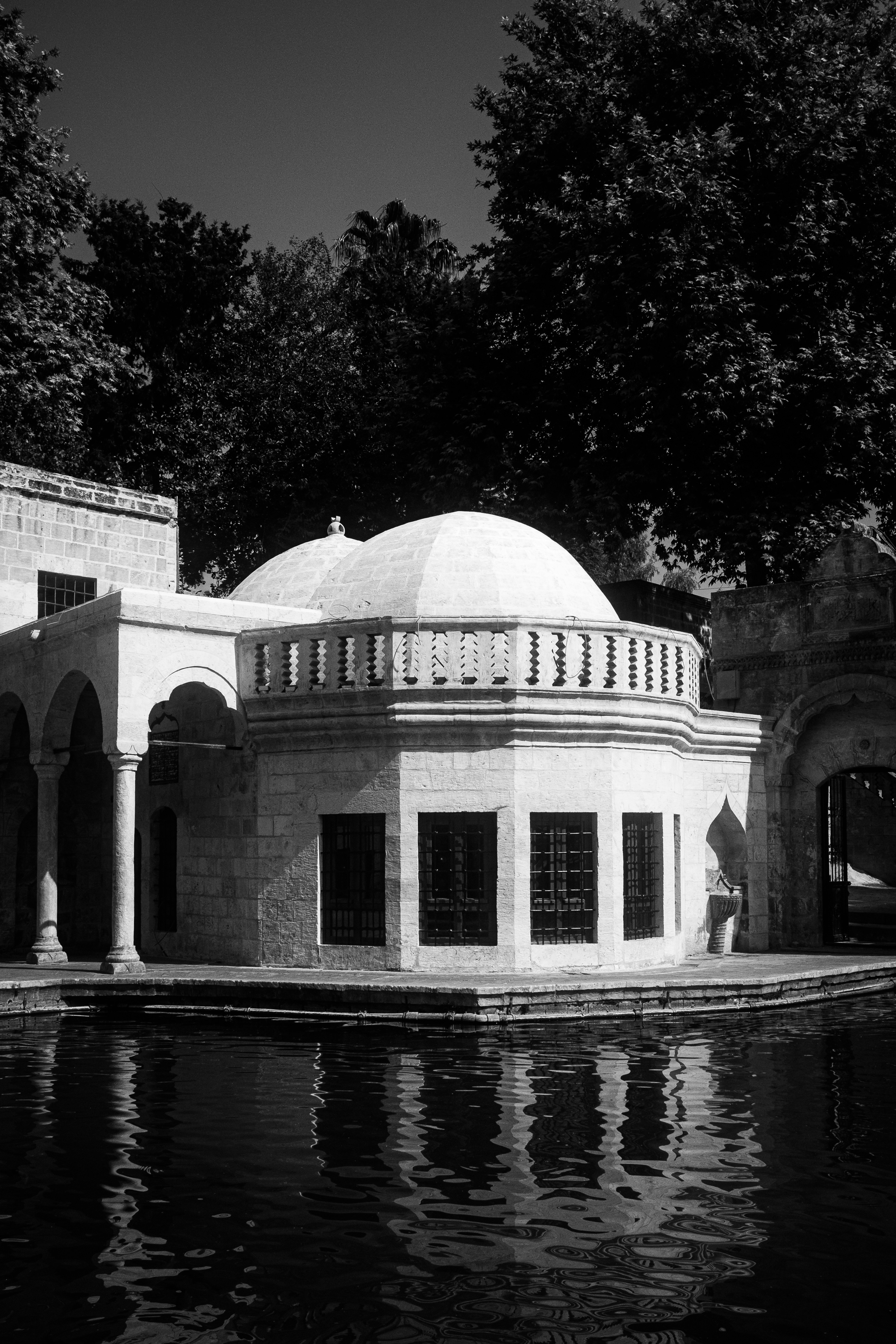 Moonlit Pavilion Rising from the Dark Water