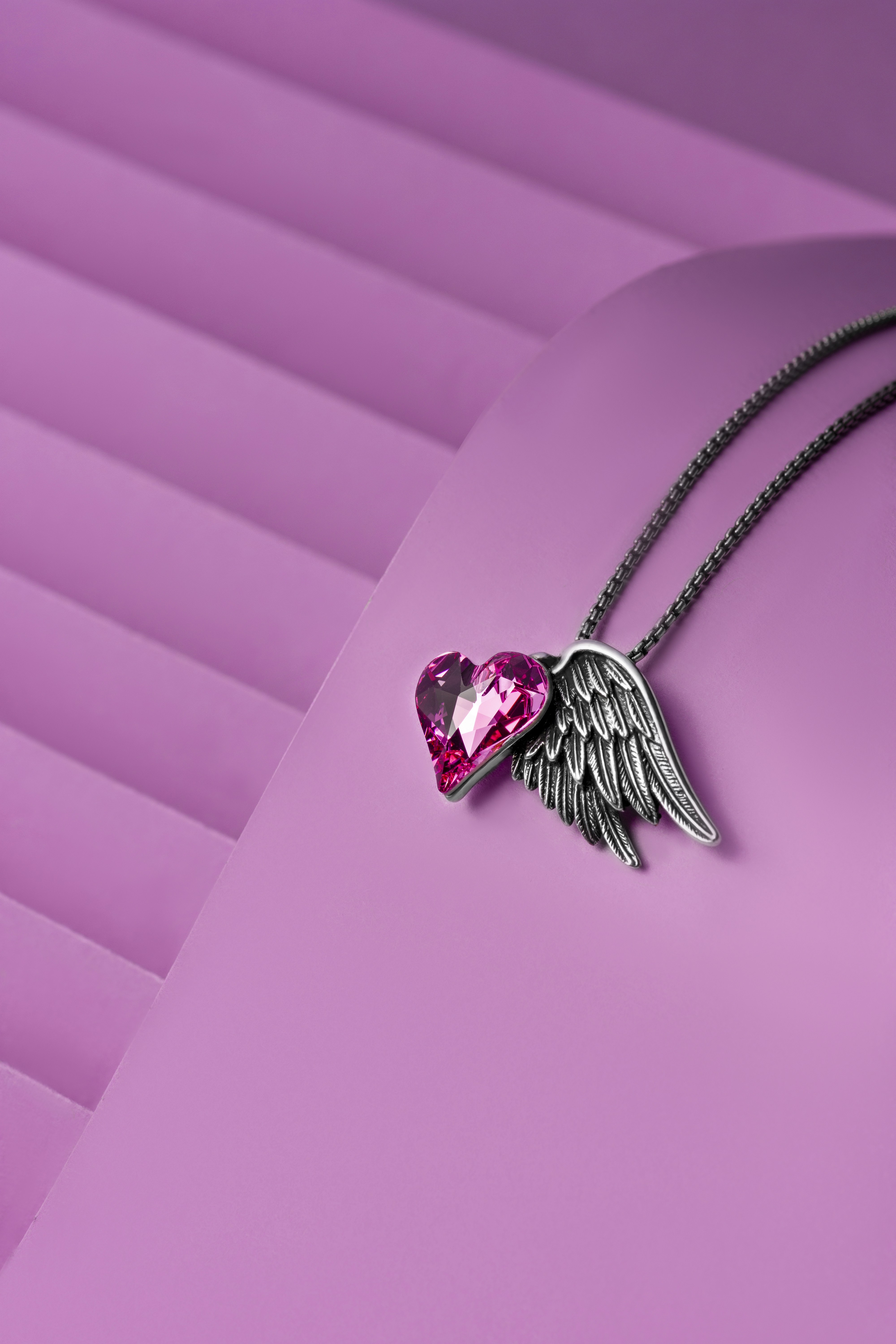 Heart-winged Pendant on Violet Backdrop