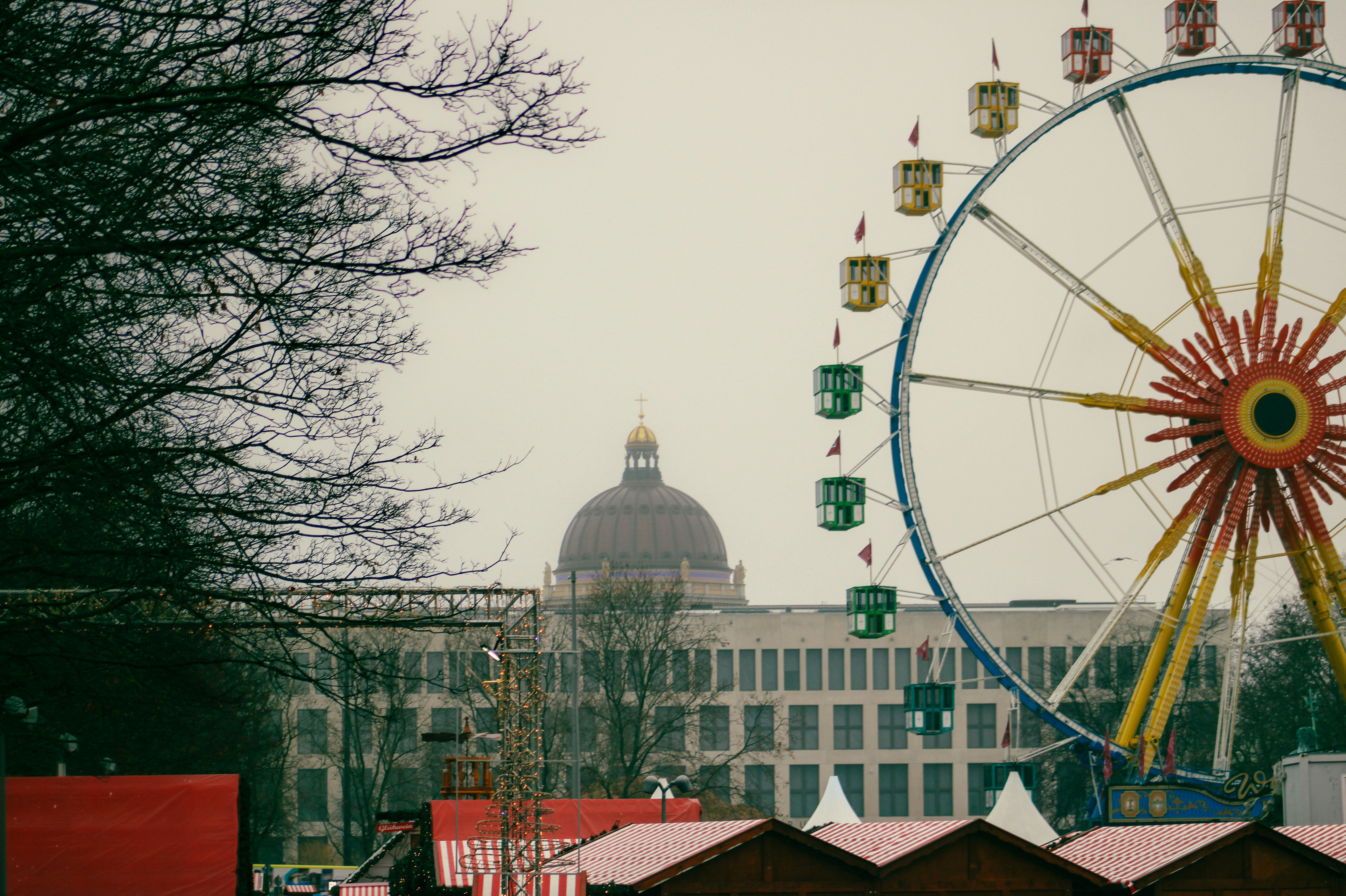 Ferris Wheel Overlooking a Winter Market