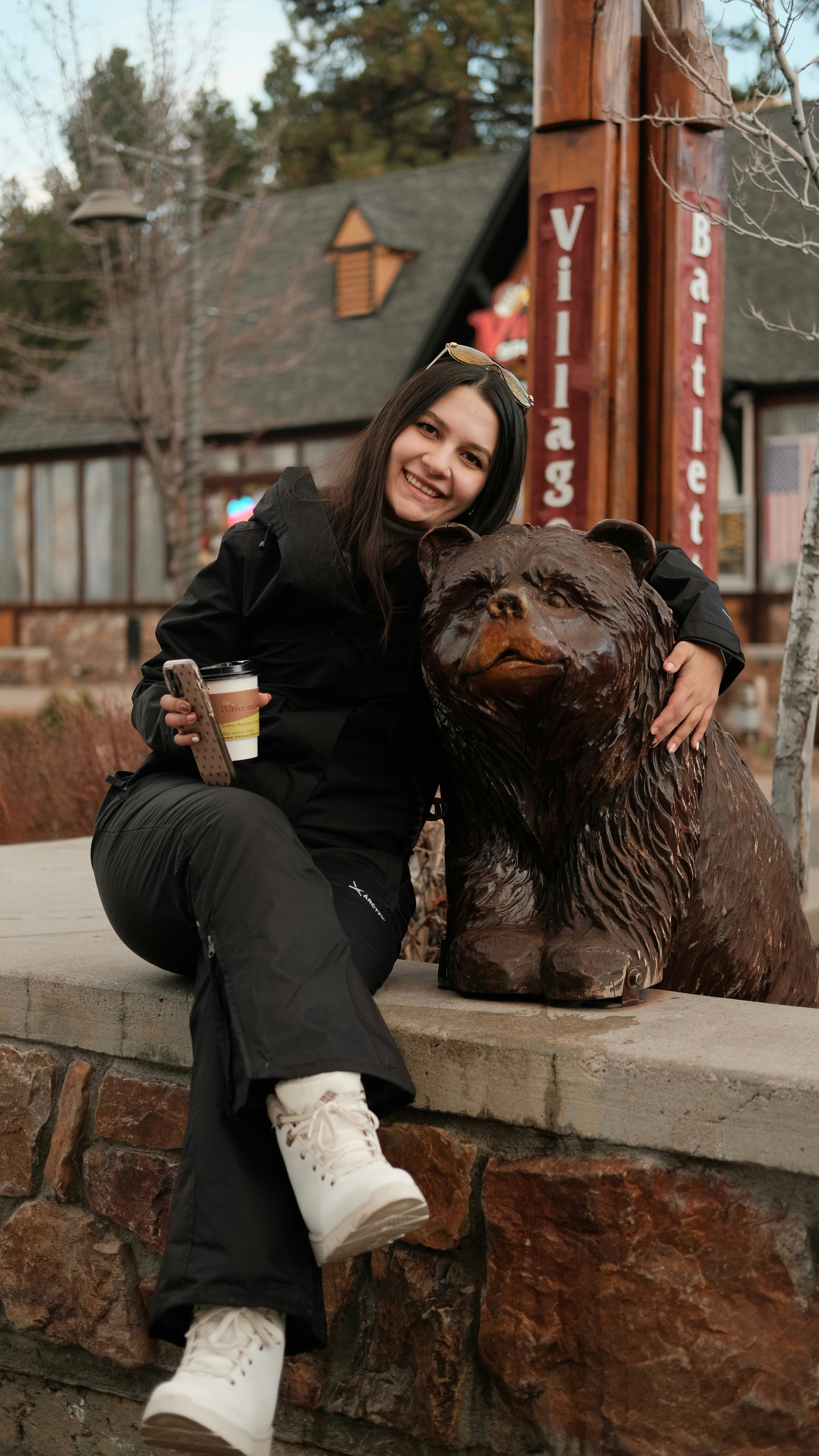 Smiles by the Bear: A Cozy Moment at the Village Park