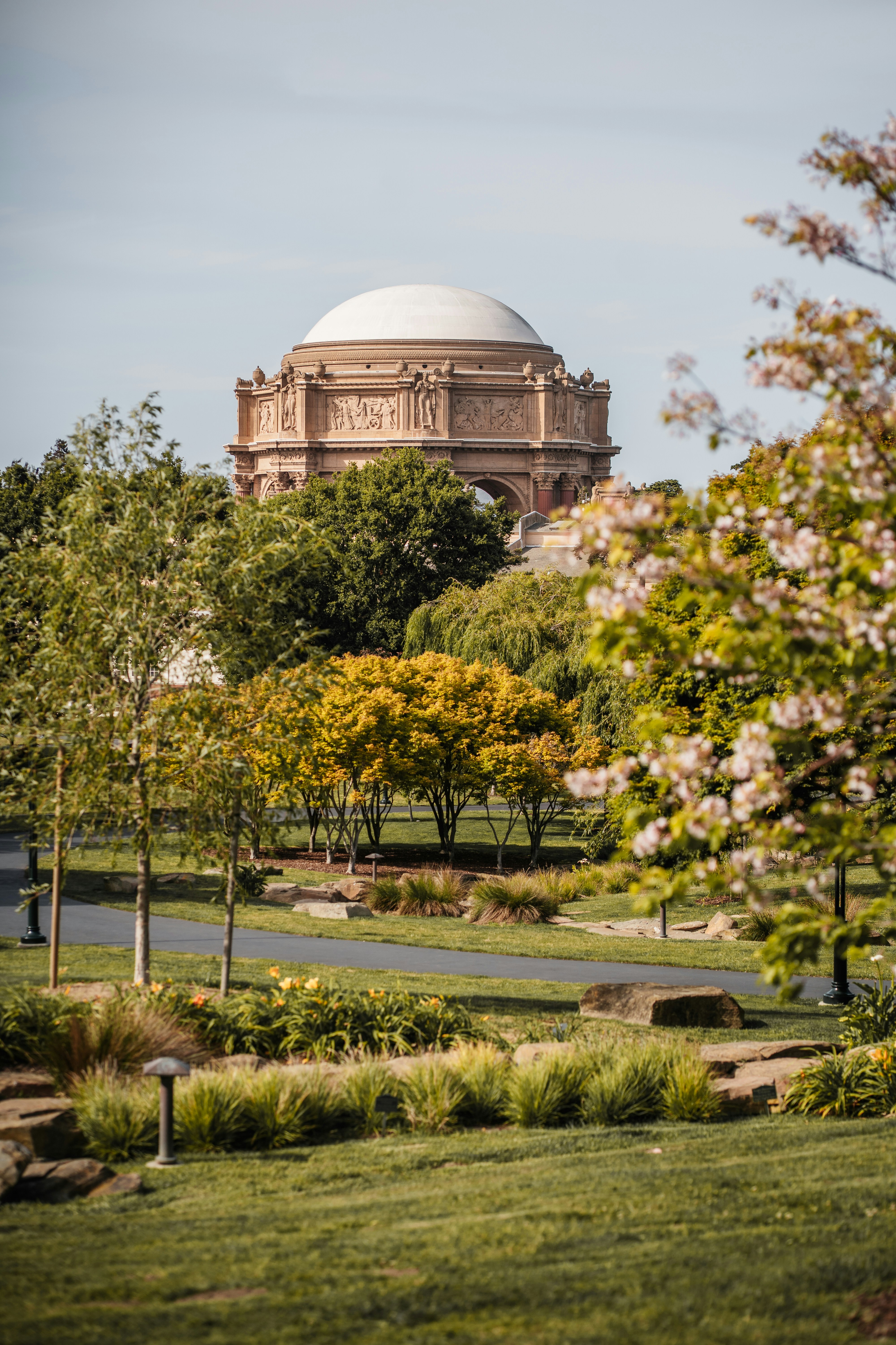Dome Over Green: A Classical Vista Framed by Autumn Foliage