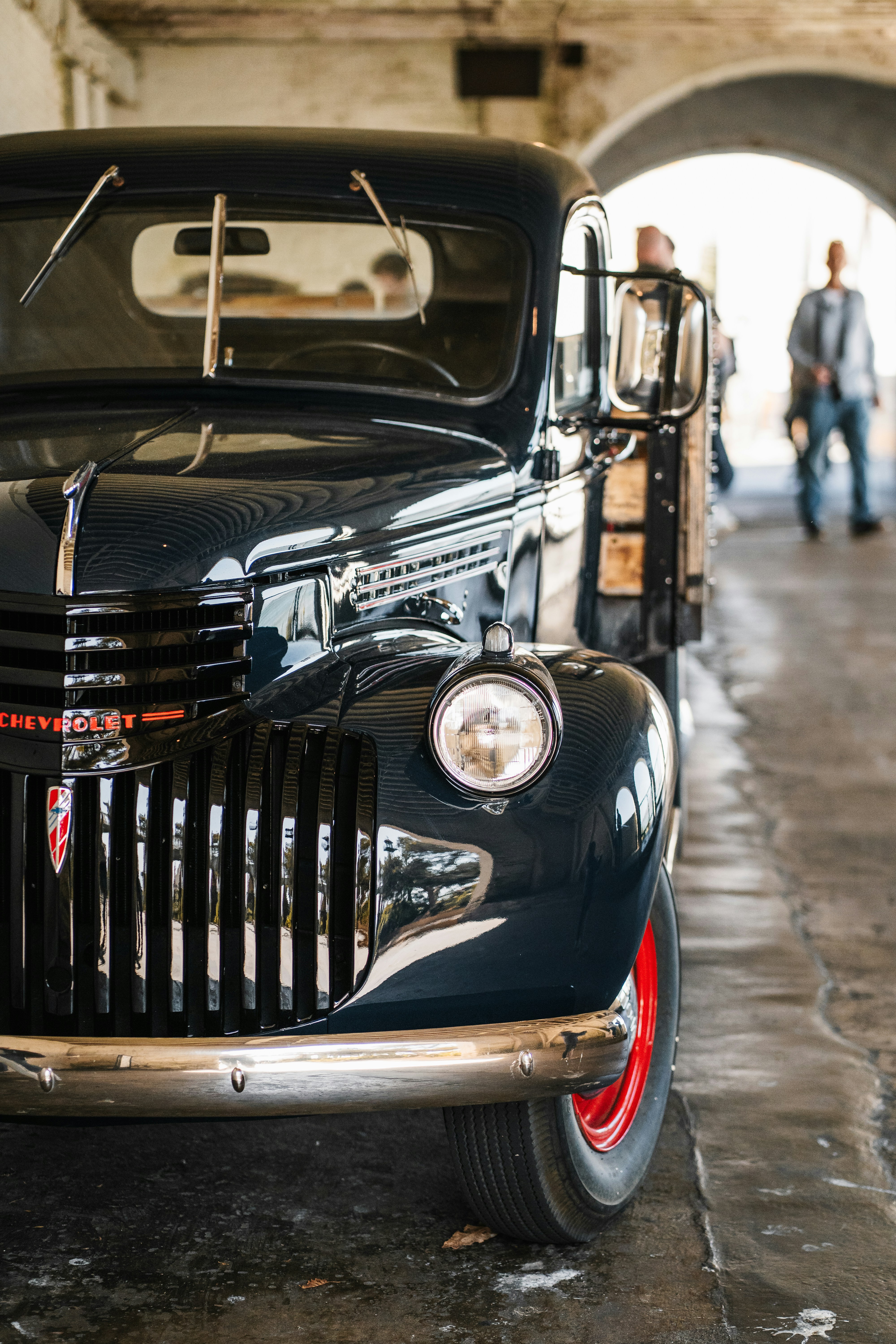 Chrome and Shadows: A Vintage Chevrolet Surges into Frame