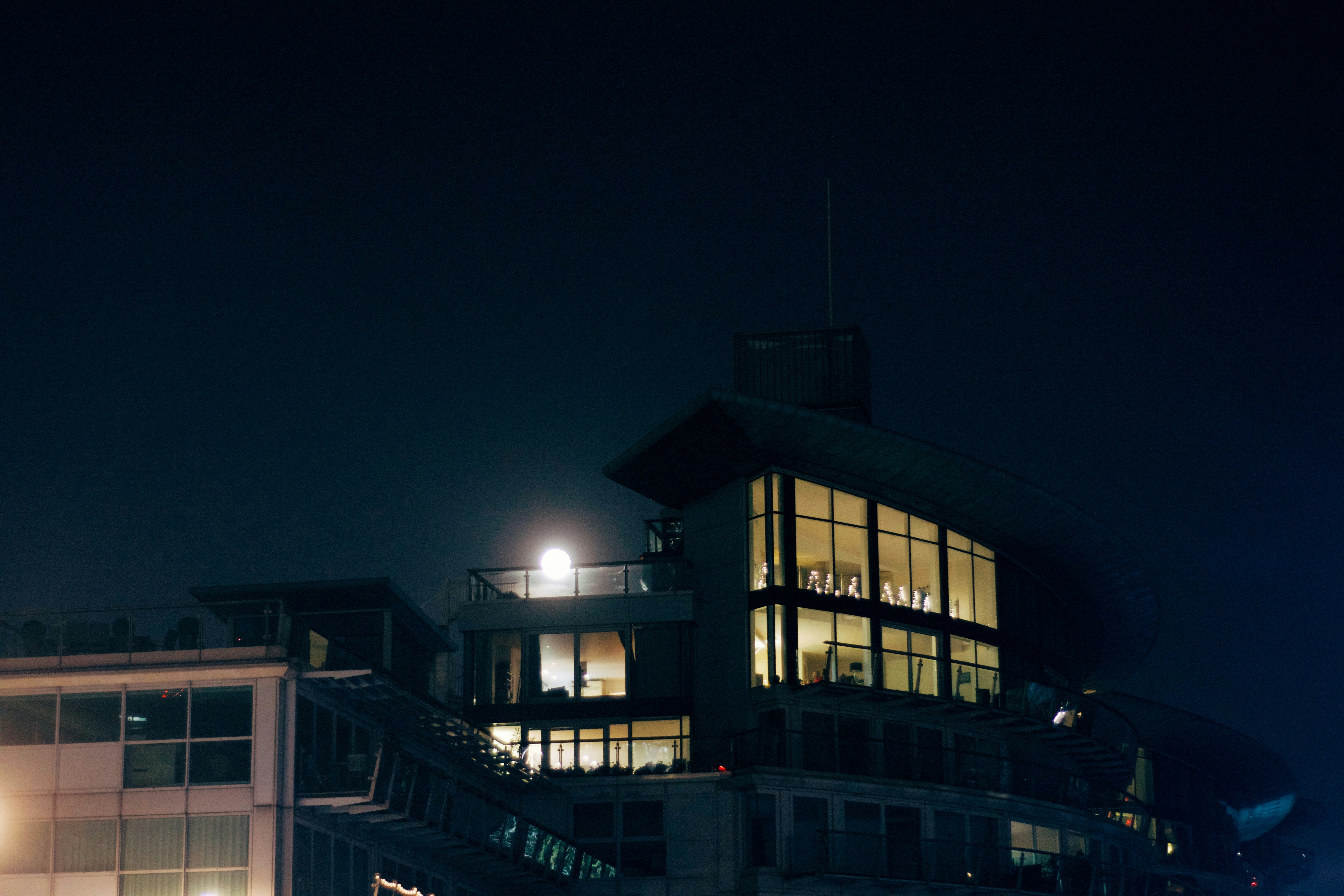 Nighttime Rooftop Observatory Glows Above the City