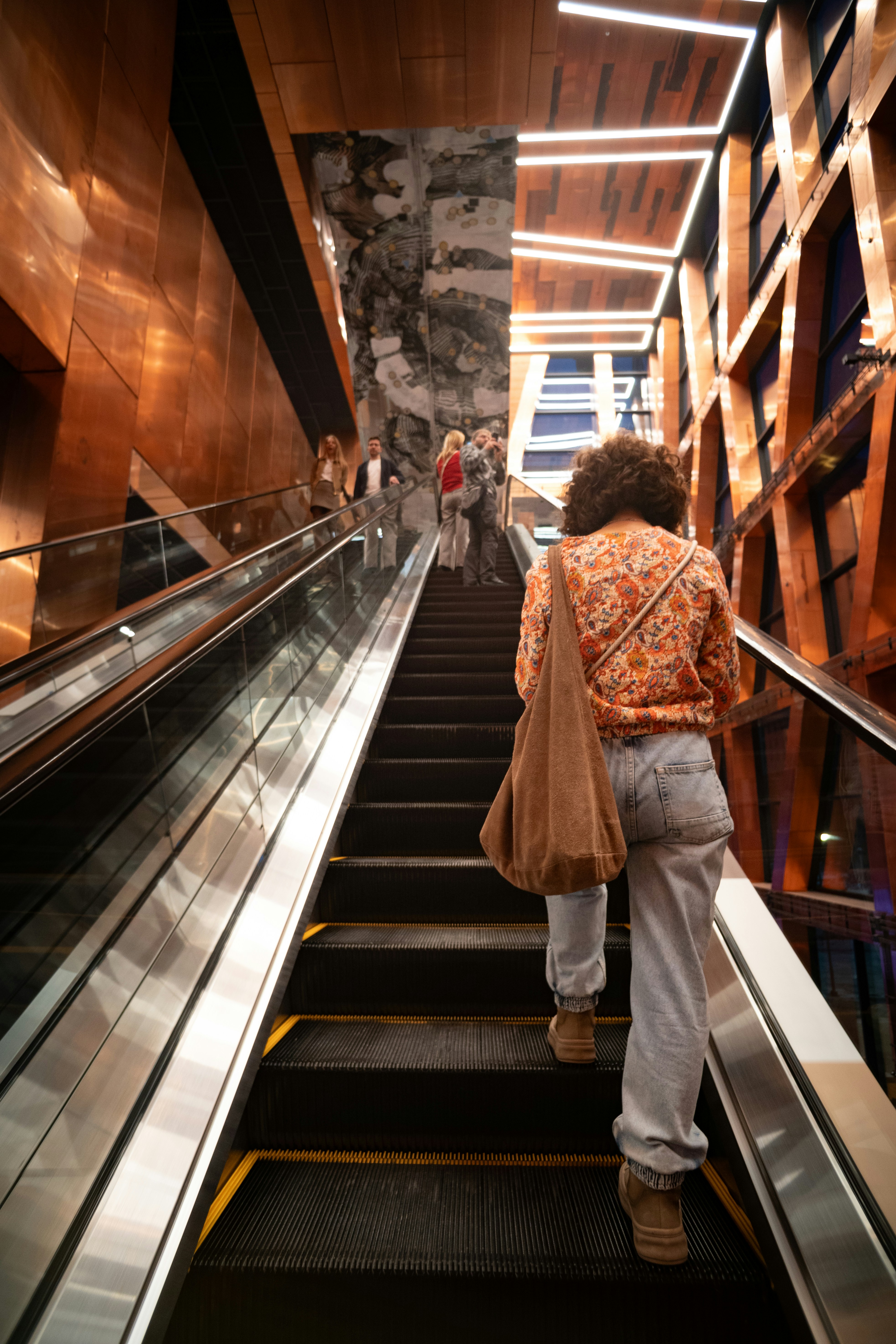 Ascending in Style: A Portrait on the Moving Staircase