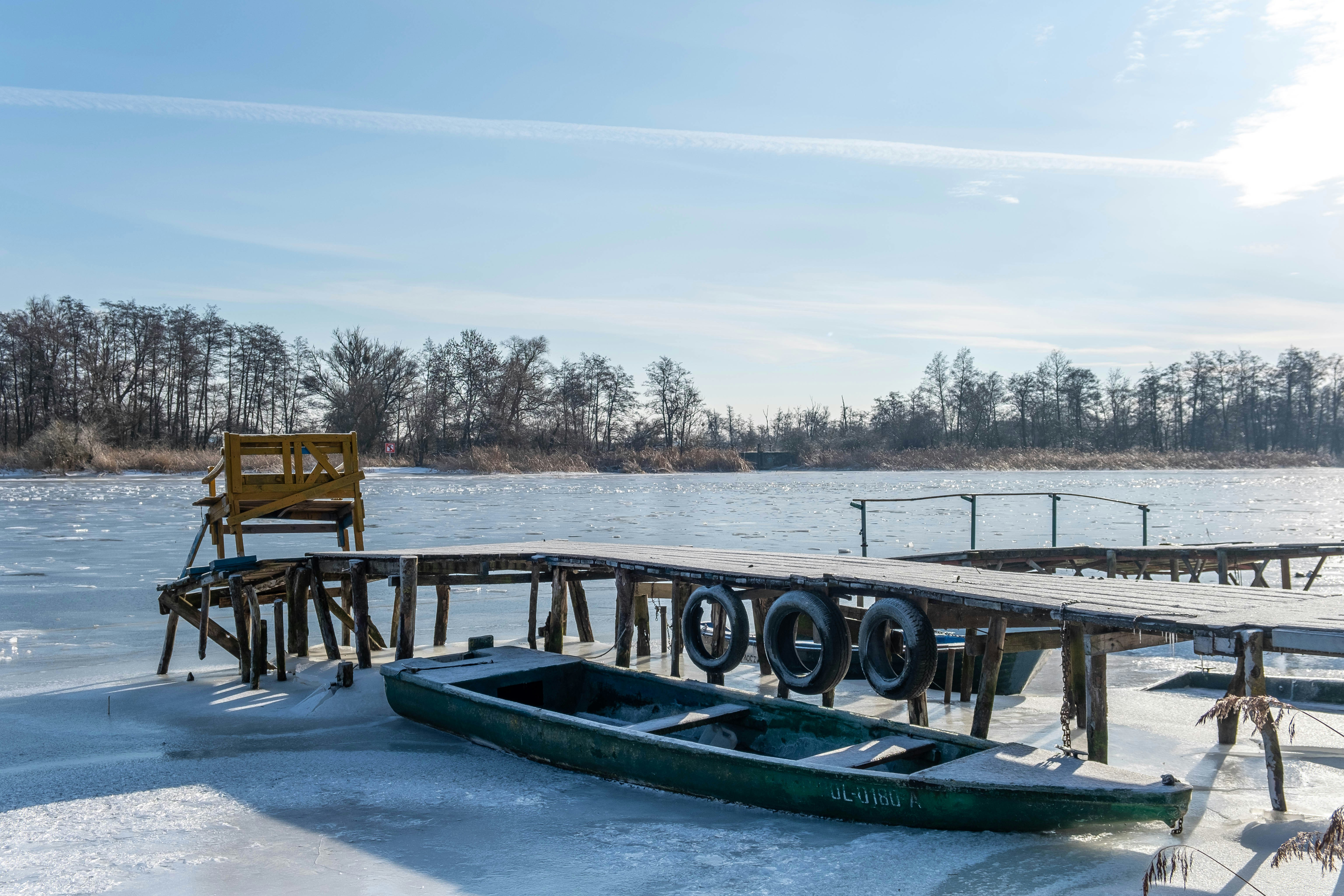 Snowbound Pier and Boat at First Light
