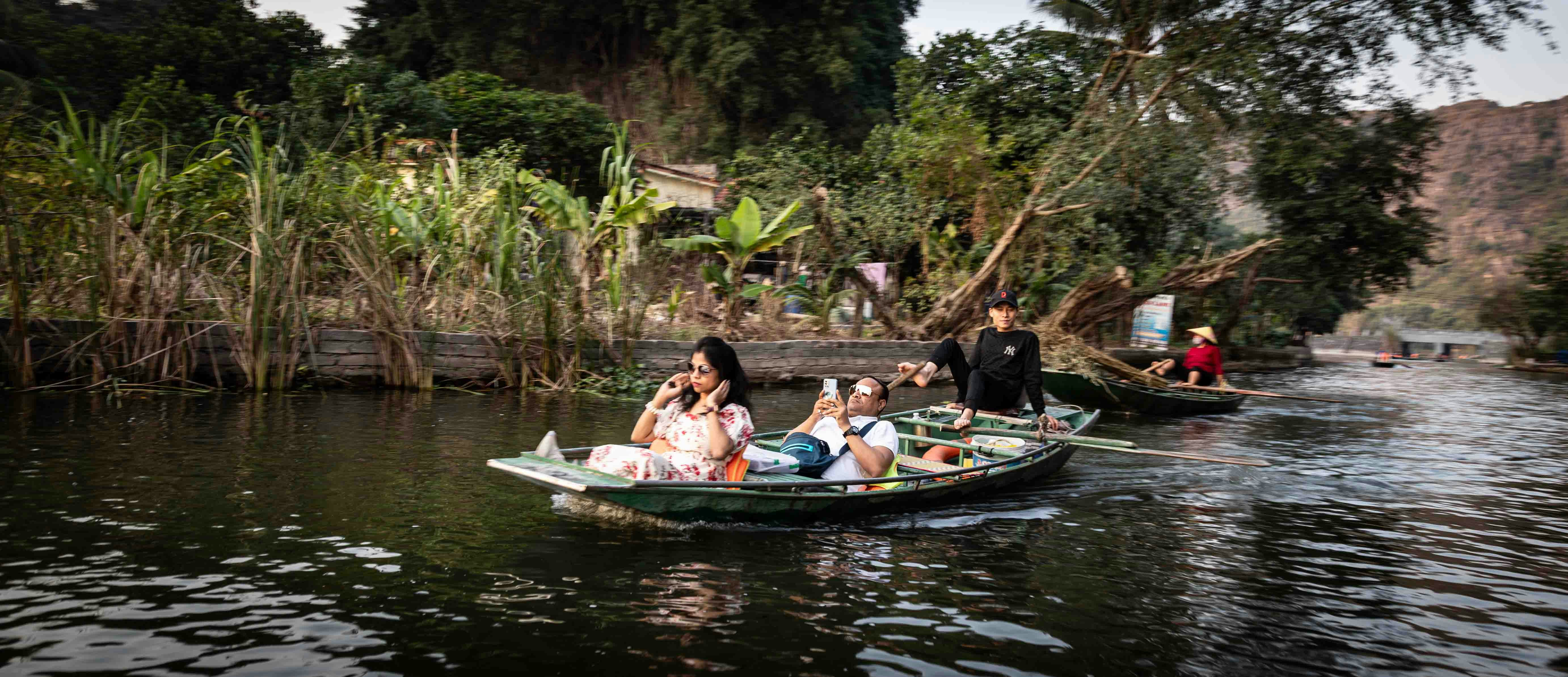 A Quiet Boat Ride Through a Riverside Village