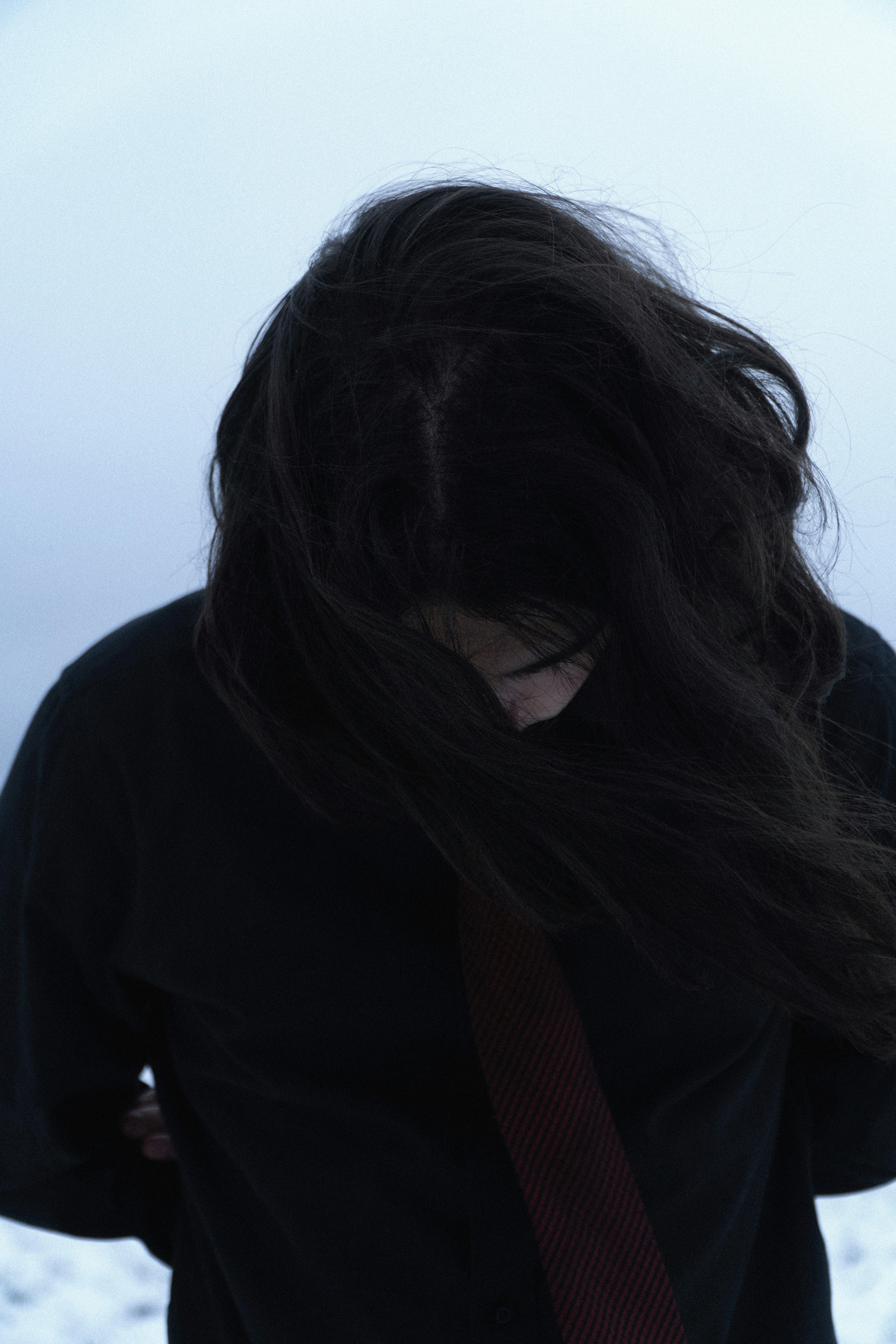 Storm of Hair: A Quiet Portrait in Winter Light