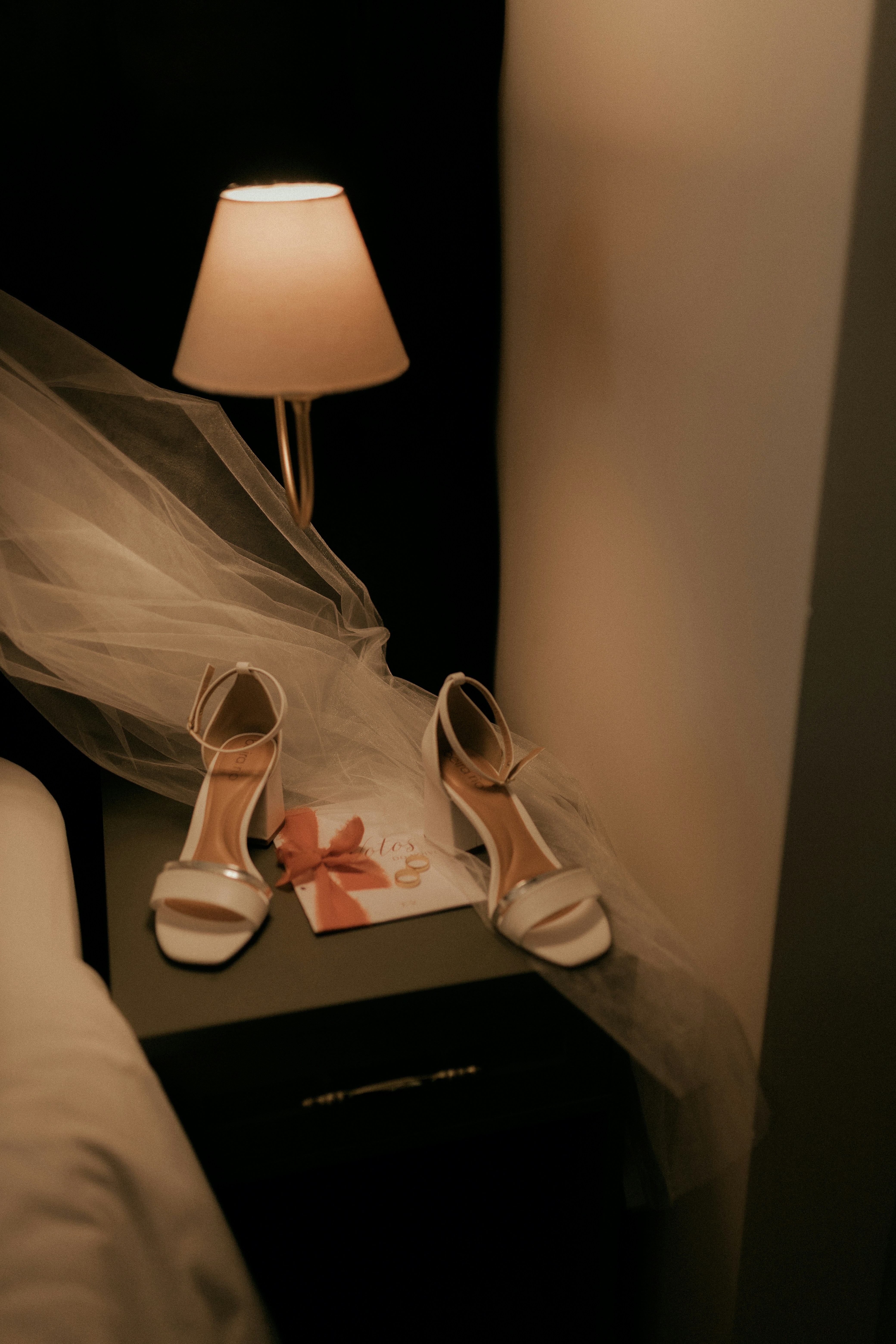 Bride’s Dècor: Satin Heels and Veil on Nightstand