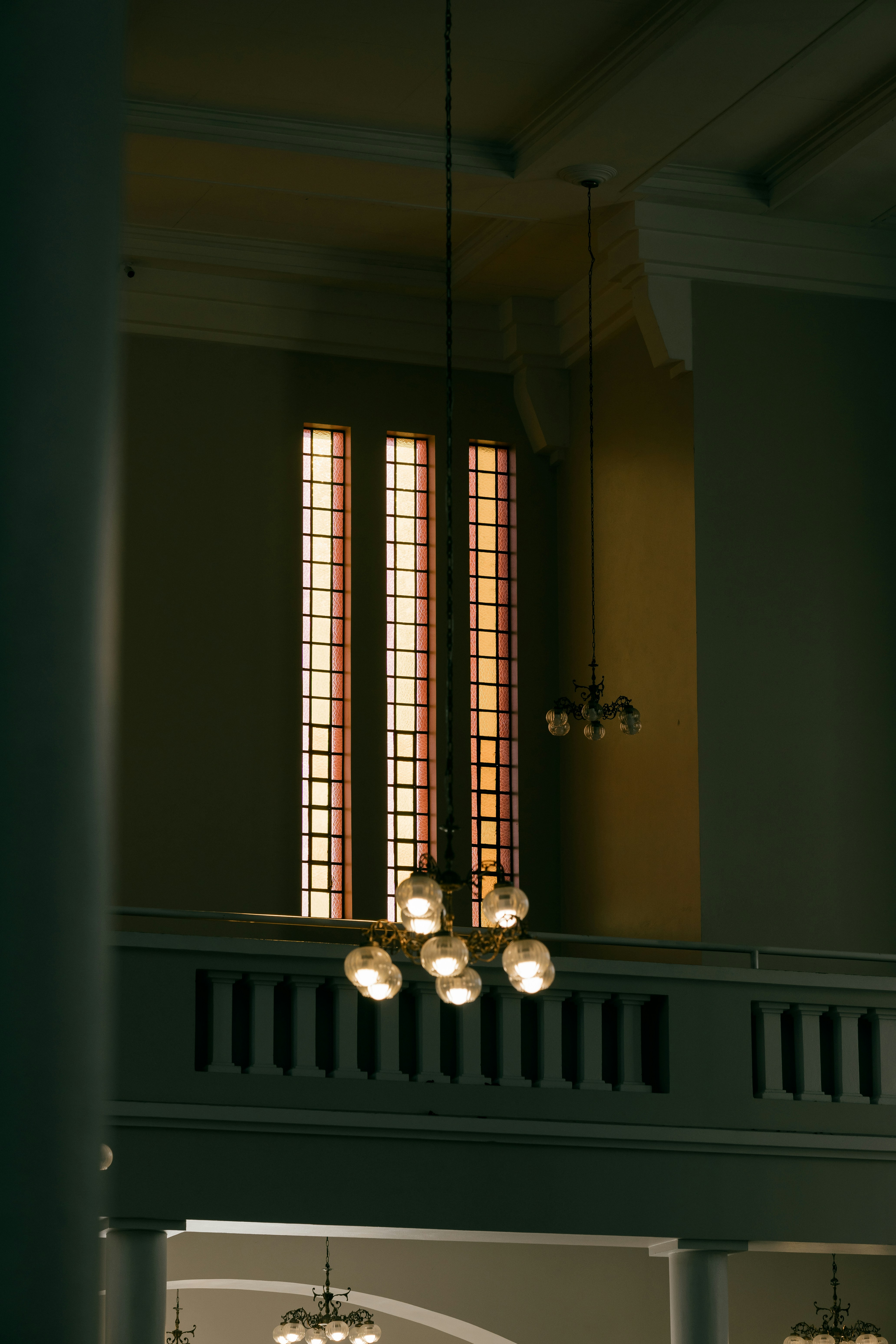 Hanging Glass Orbs Illuminate a Quiet Interior