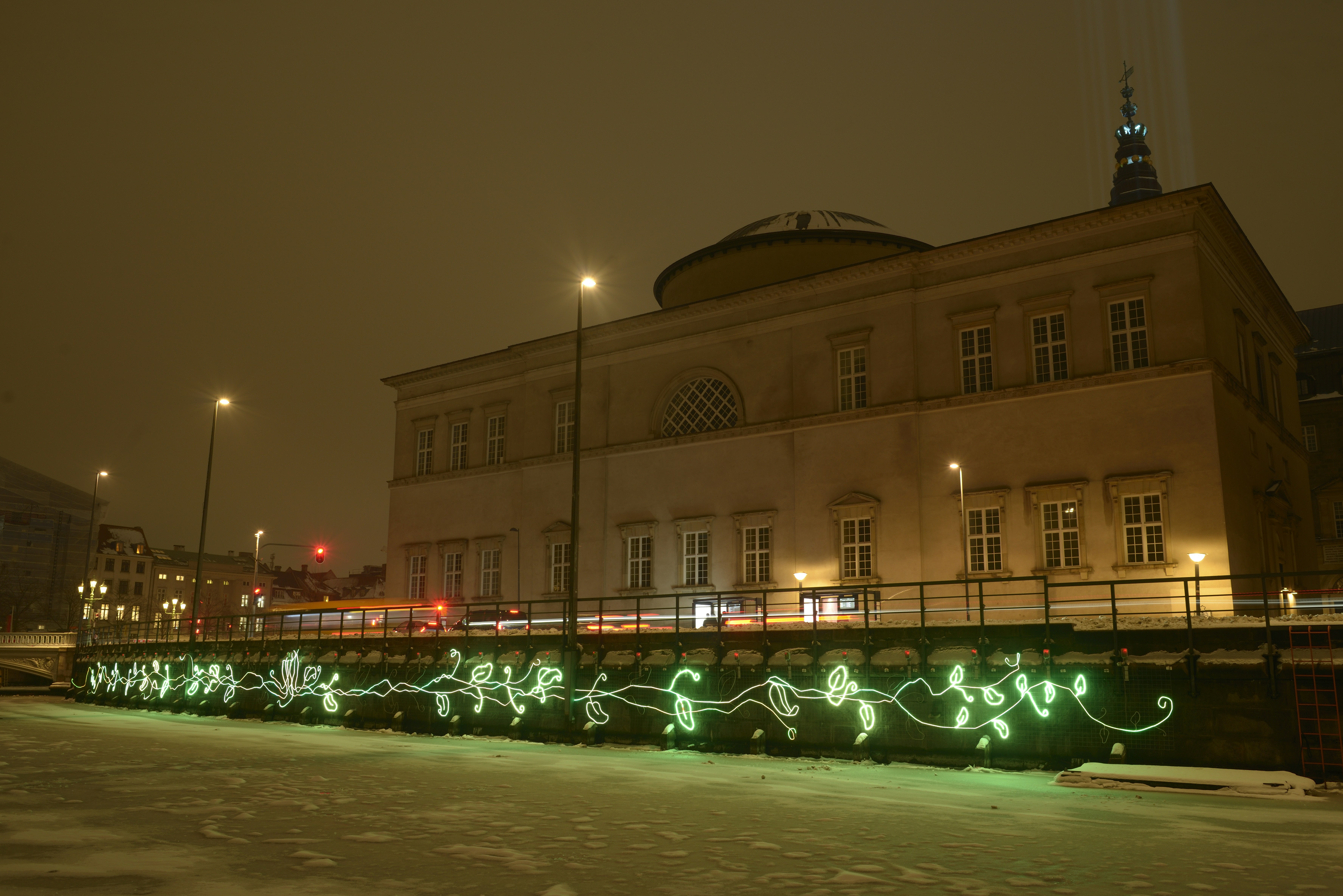 Nighttime Facade with Neon Dagger of Light