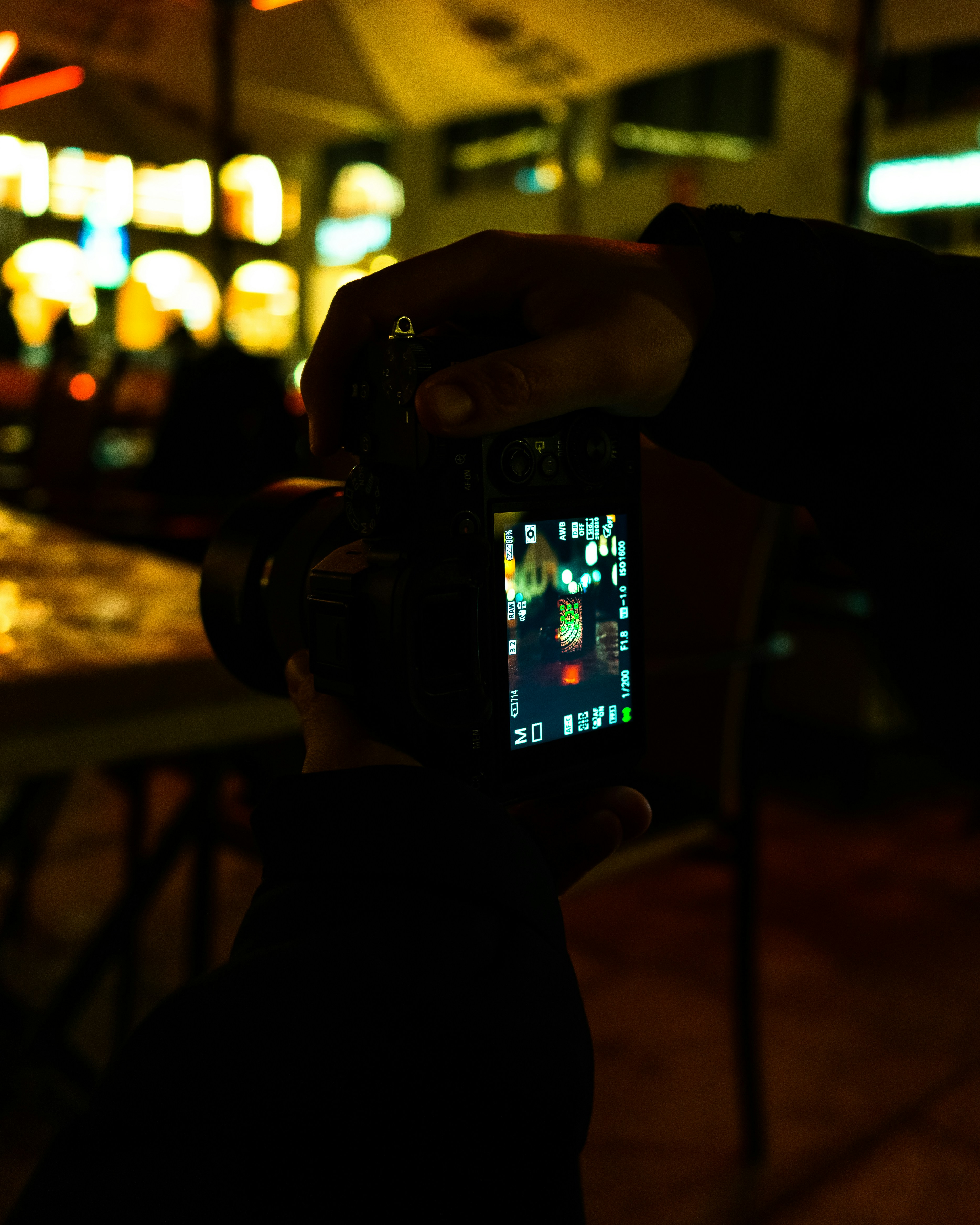 Midnight Portrait: A Handheld Sony Moment in Neon Glow