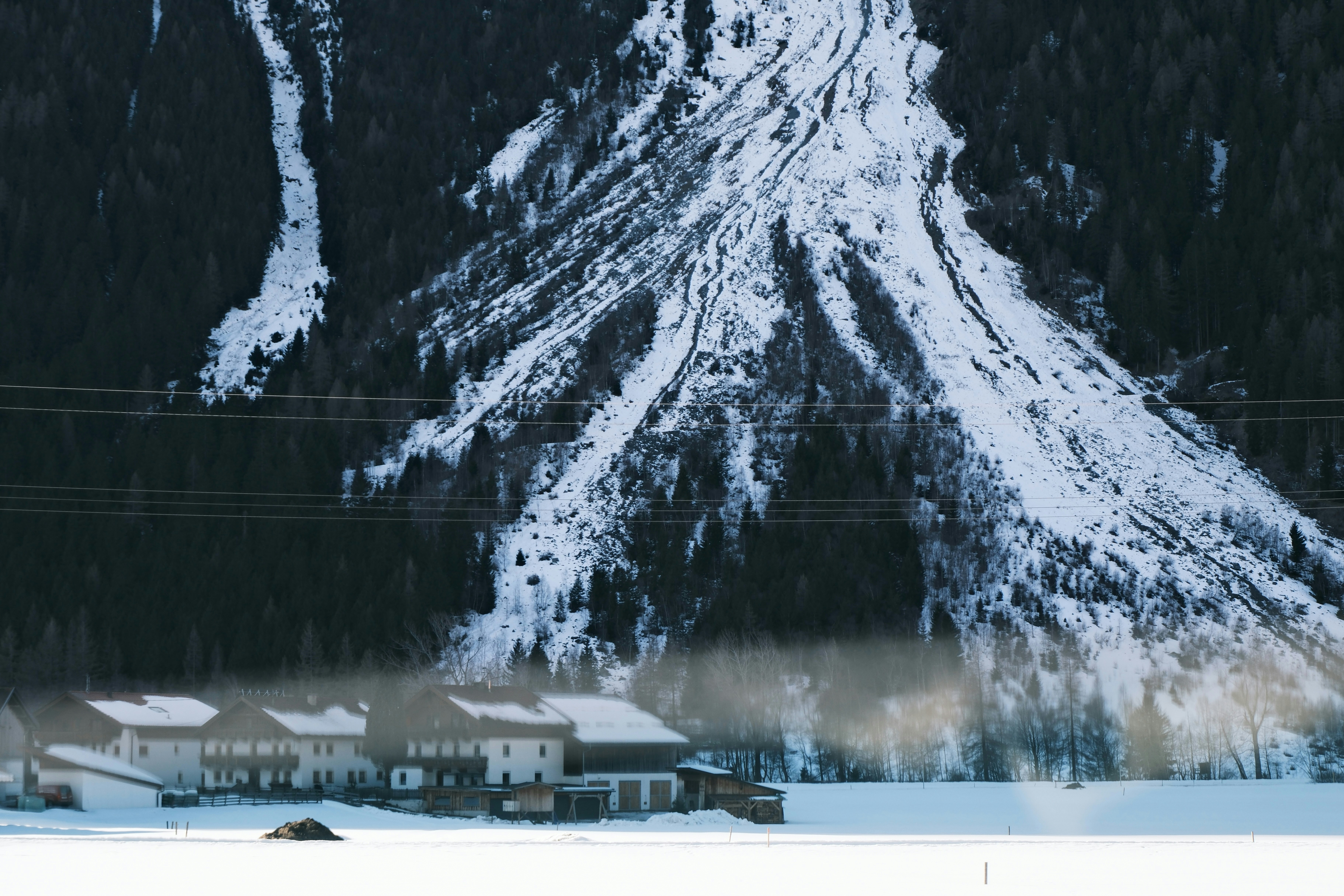 Snowfield Village at the Foot of a Icy Ridge
