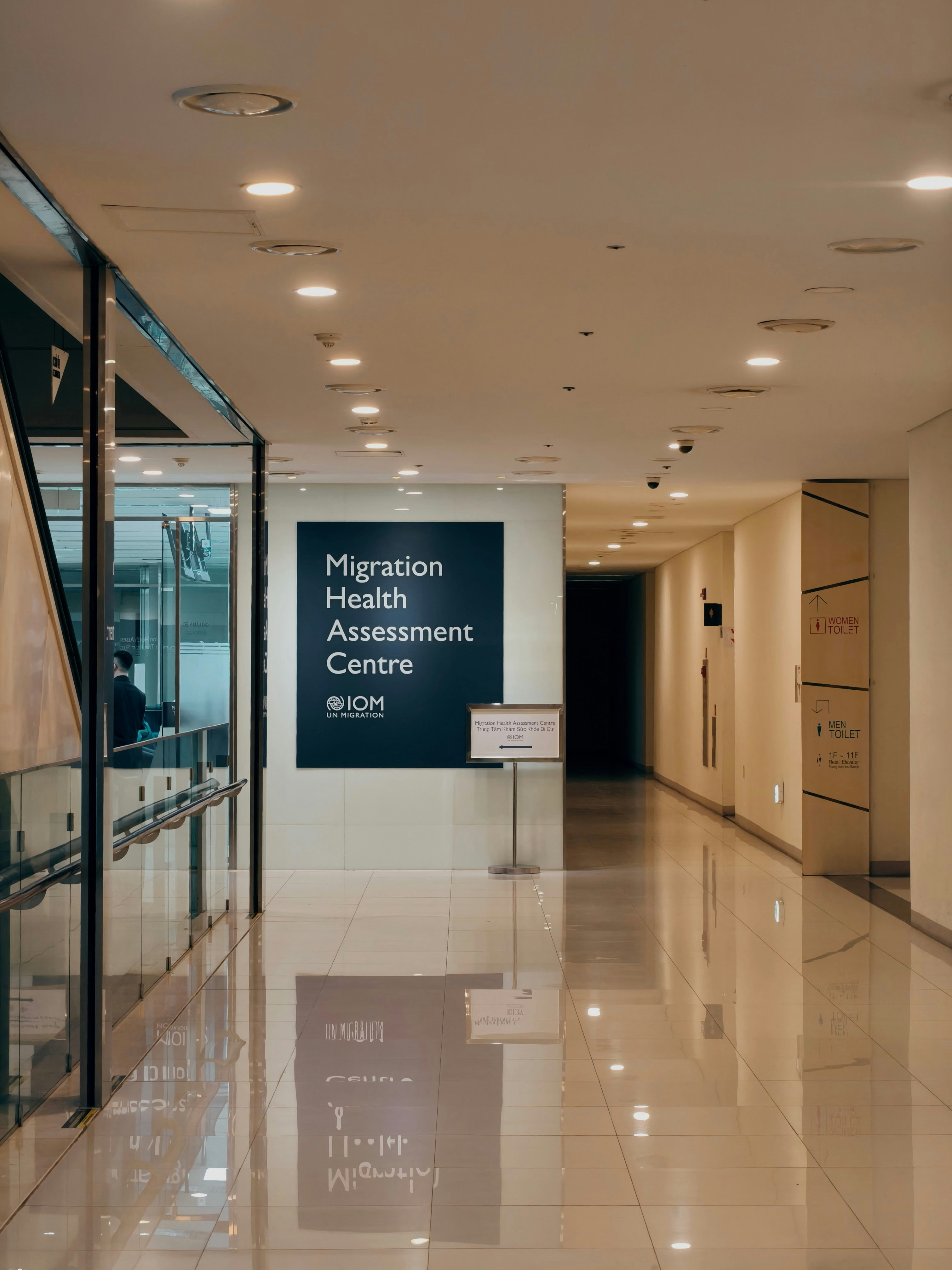 Migration health assessment centre sign on wall.