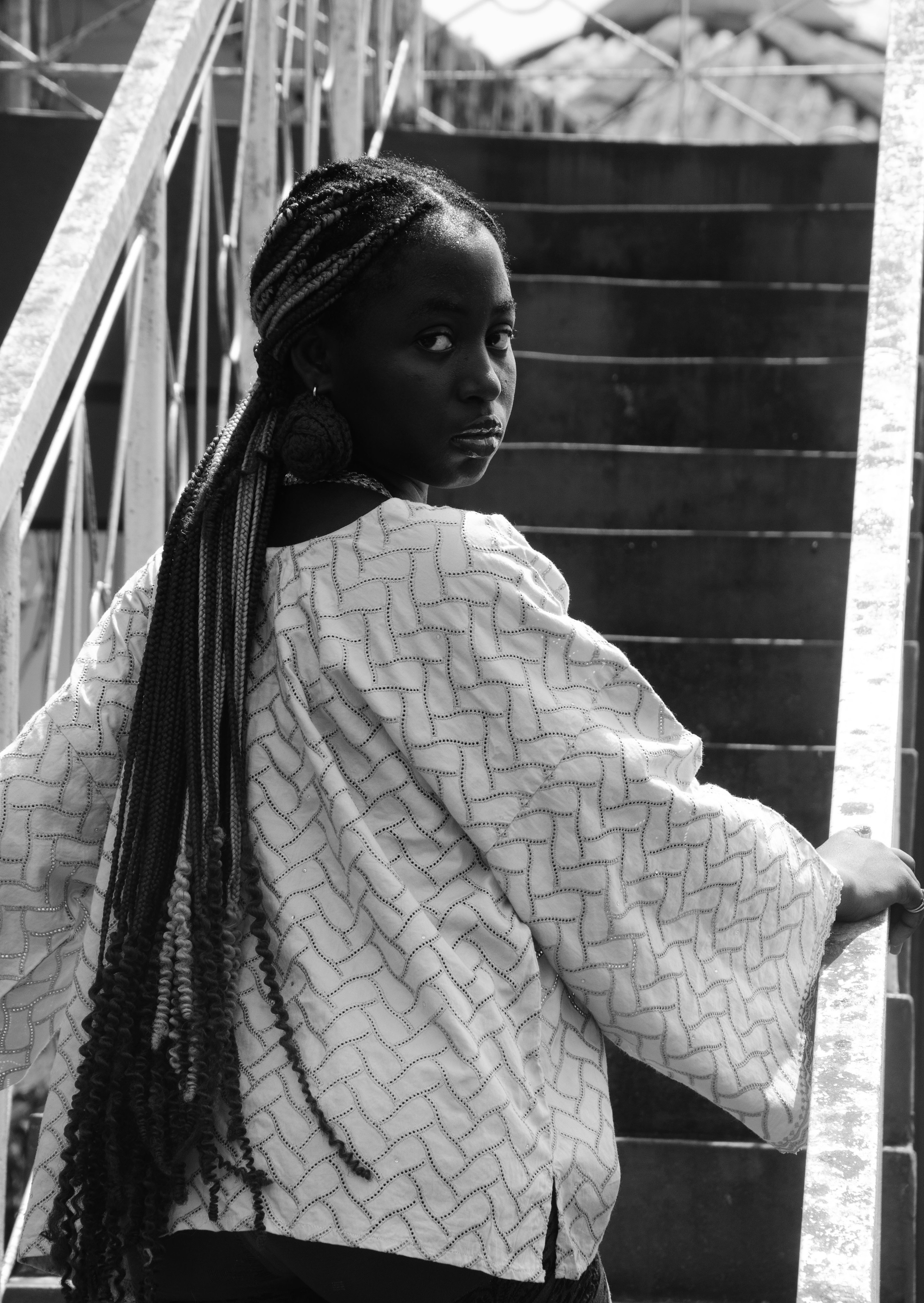 Portrait of Resolve: A Woman on a Sturdy Staircase
