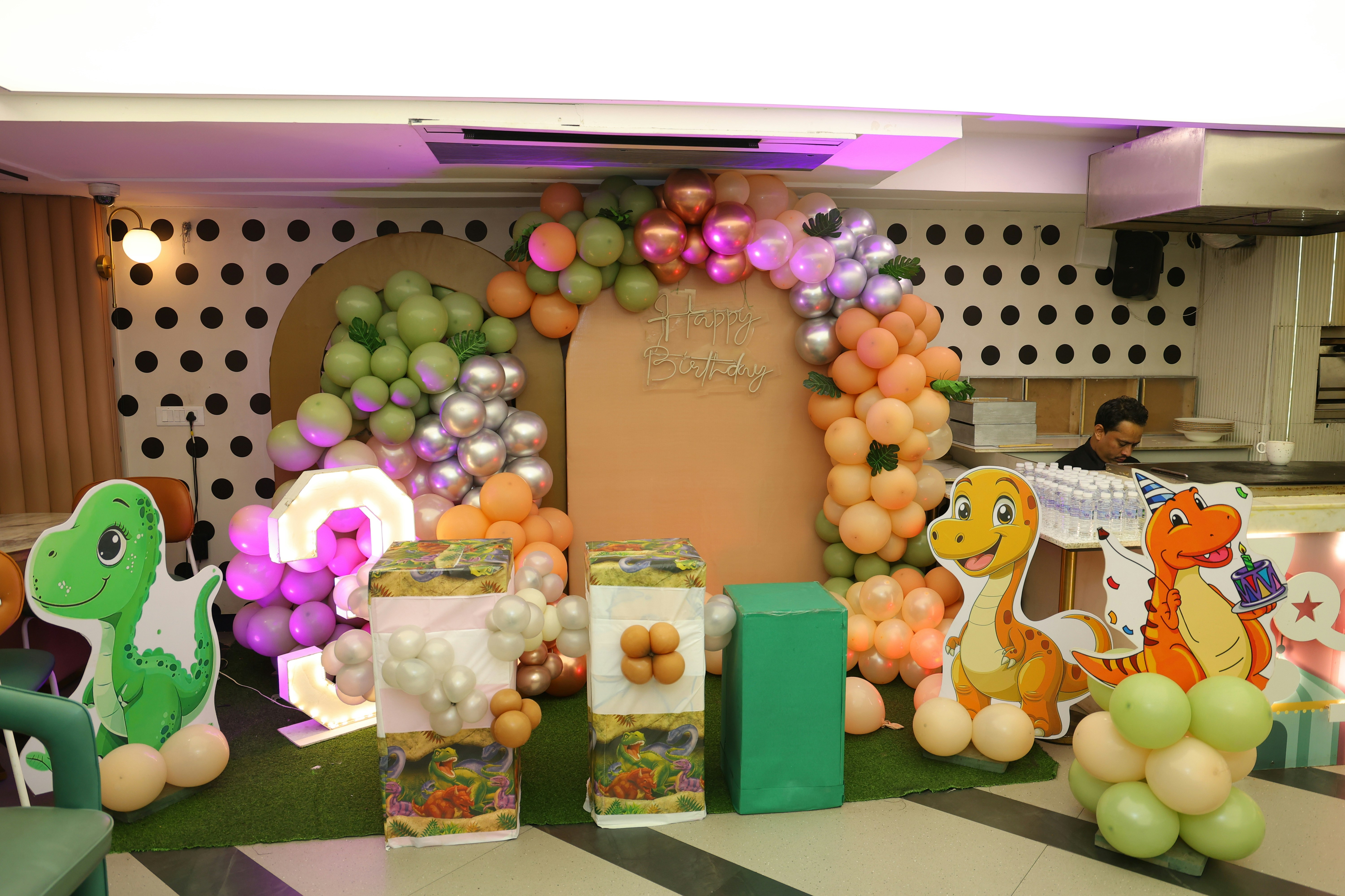 Balloon Arch Birthday Backdrop with Dino Characters and Gift Boxes