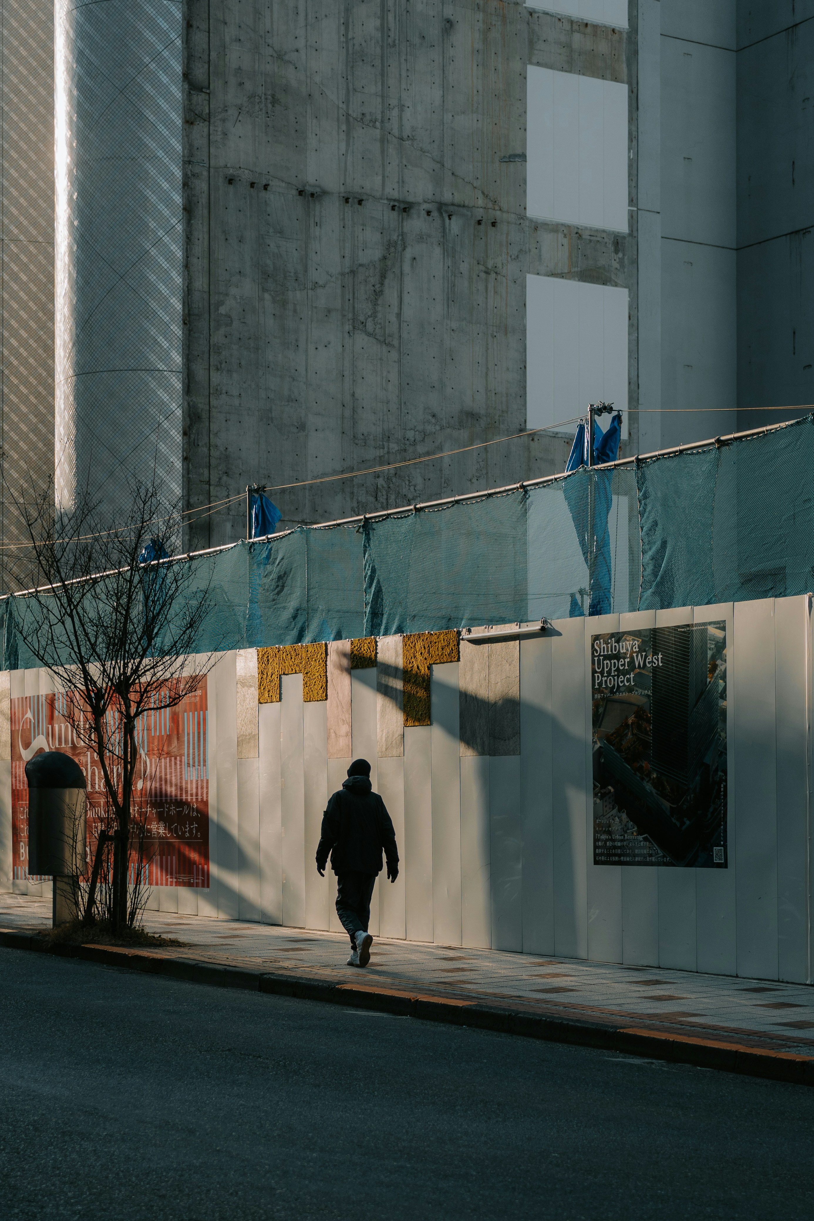 Single Pedestrian Traverses a Curated Urban Construction Scene