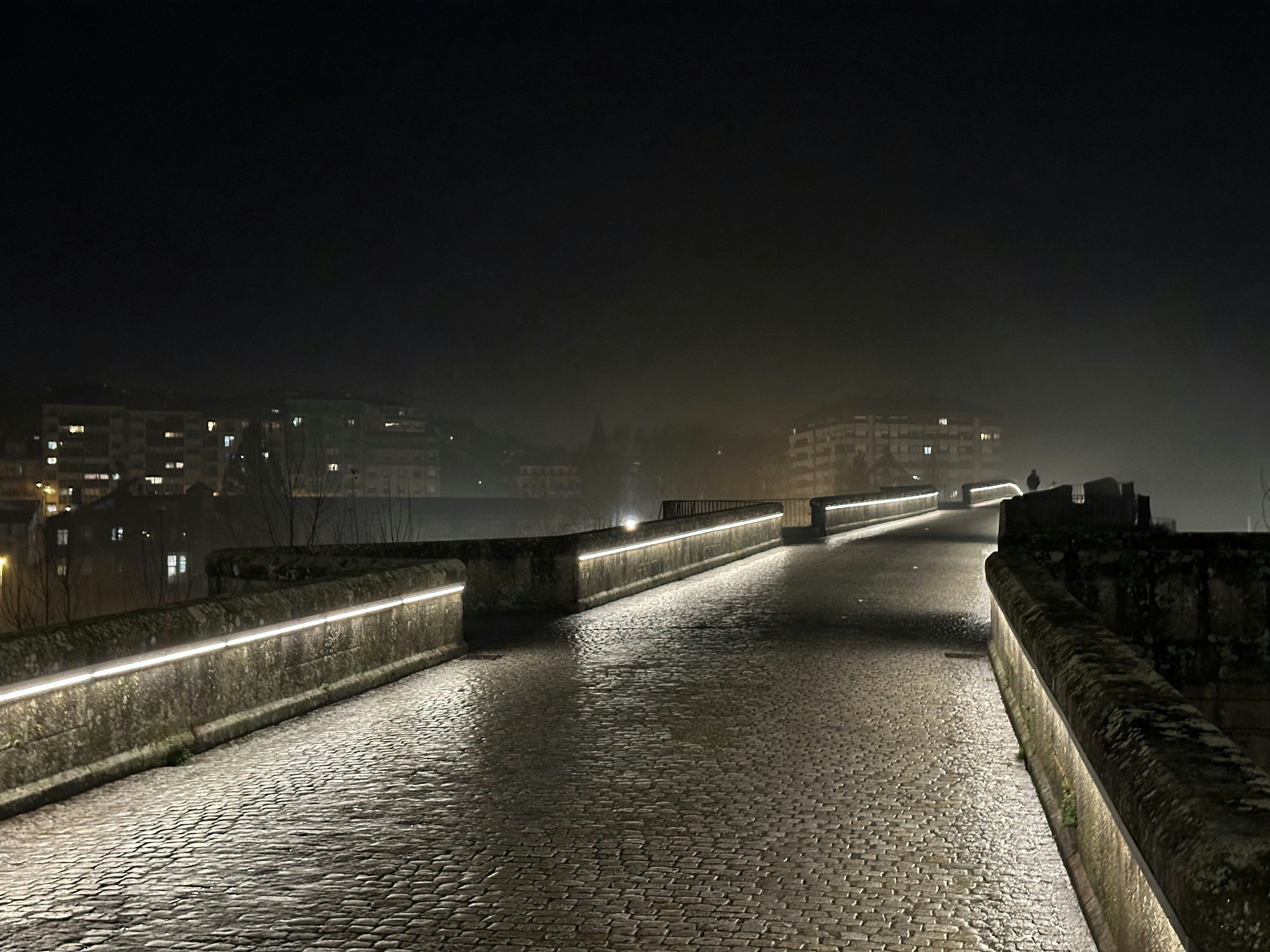 Moonlit Causeway: A Quiet Night Walk Beneath Stone Parapets