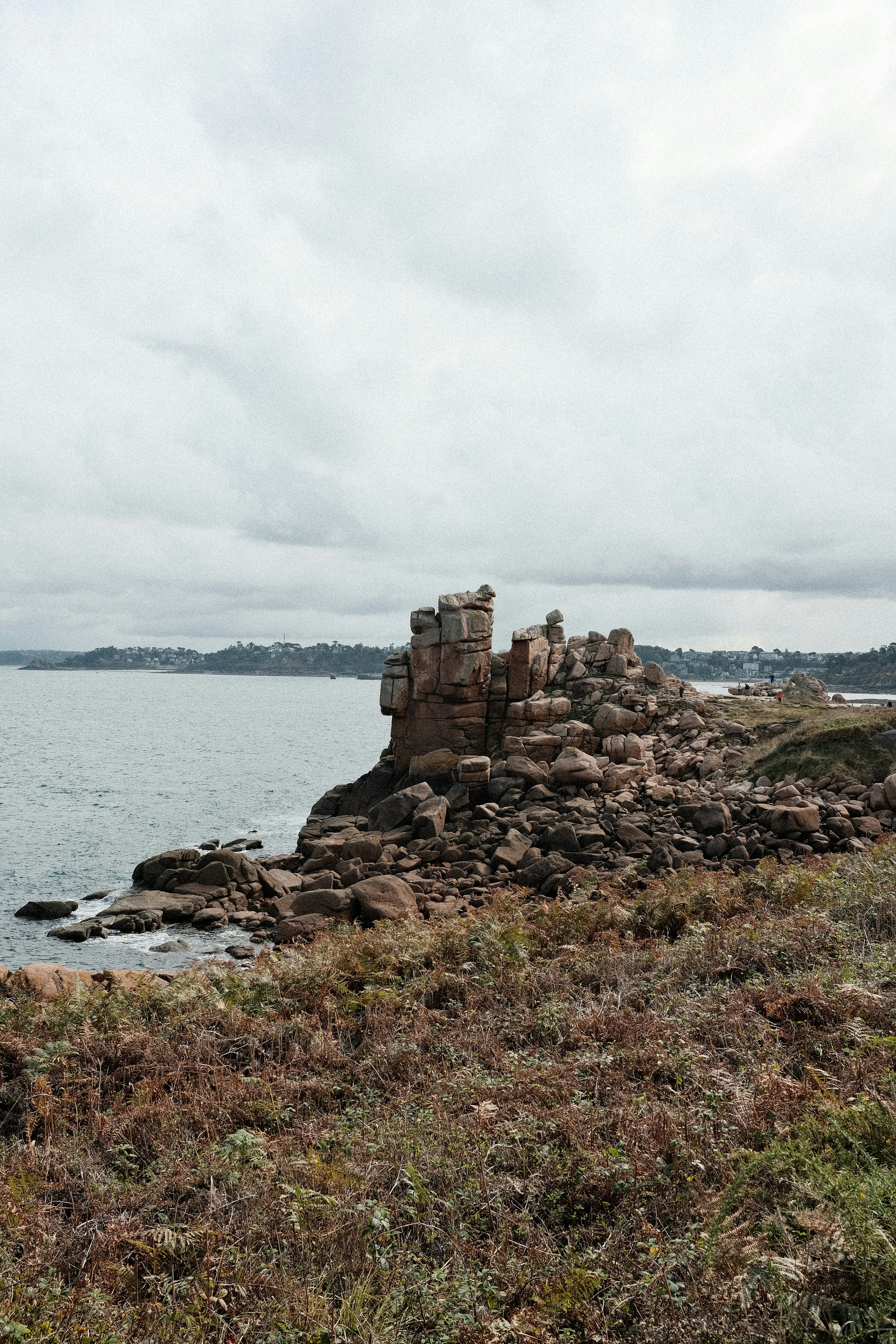 Rocky Promontory Framed by a Quiet Sea Horizon