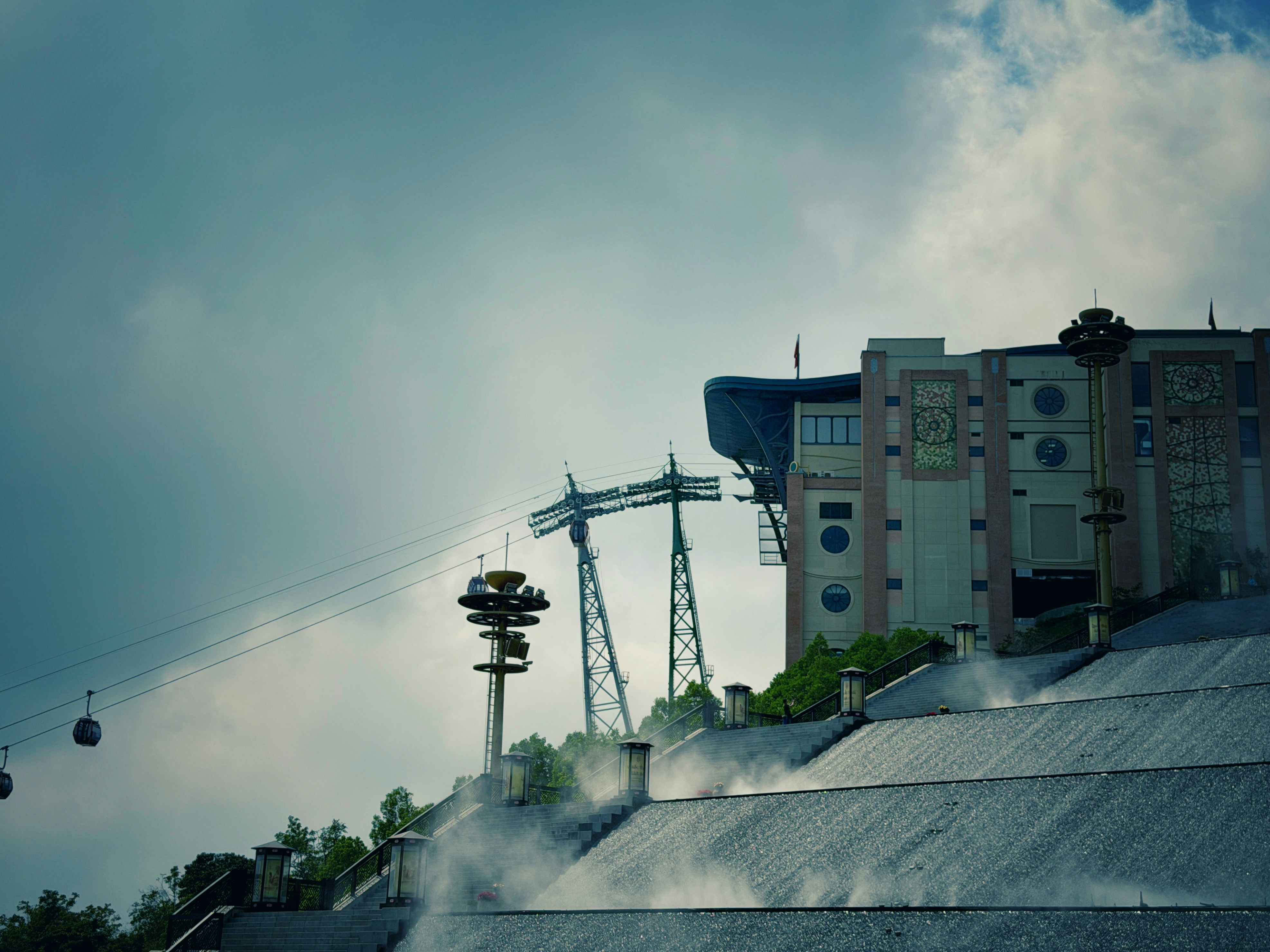 Ridgeline Cableway Above a Sloped Rooftop